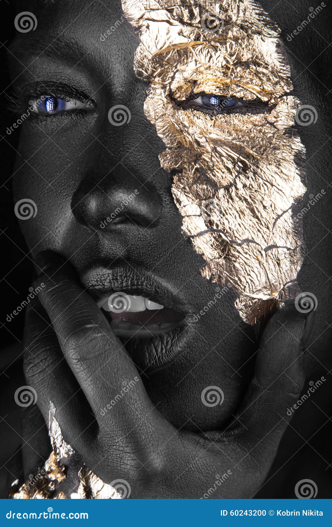 Fashion Portrait Of A Dark Skinned Girl With Gold Make Up Beauty Face
