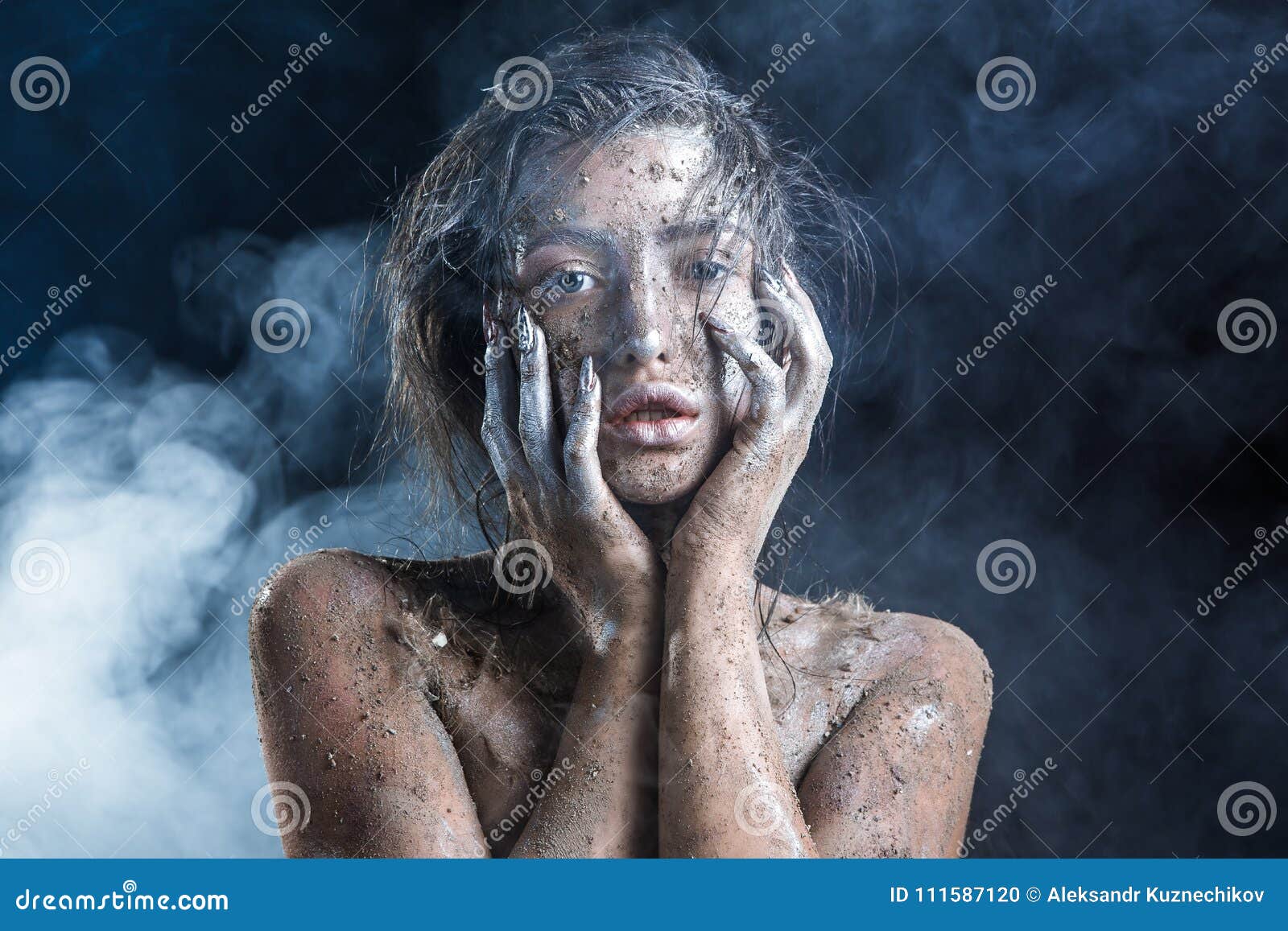 Fashion Portrait Of A Dark Skinned Girl With Silver Foil Make Up