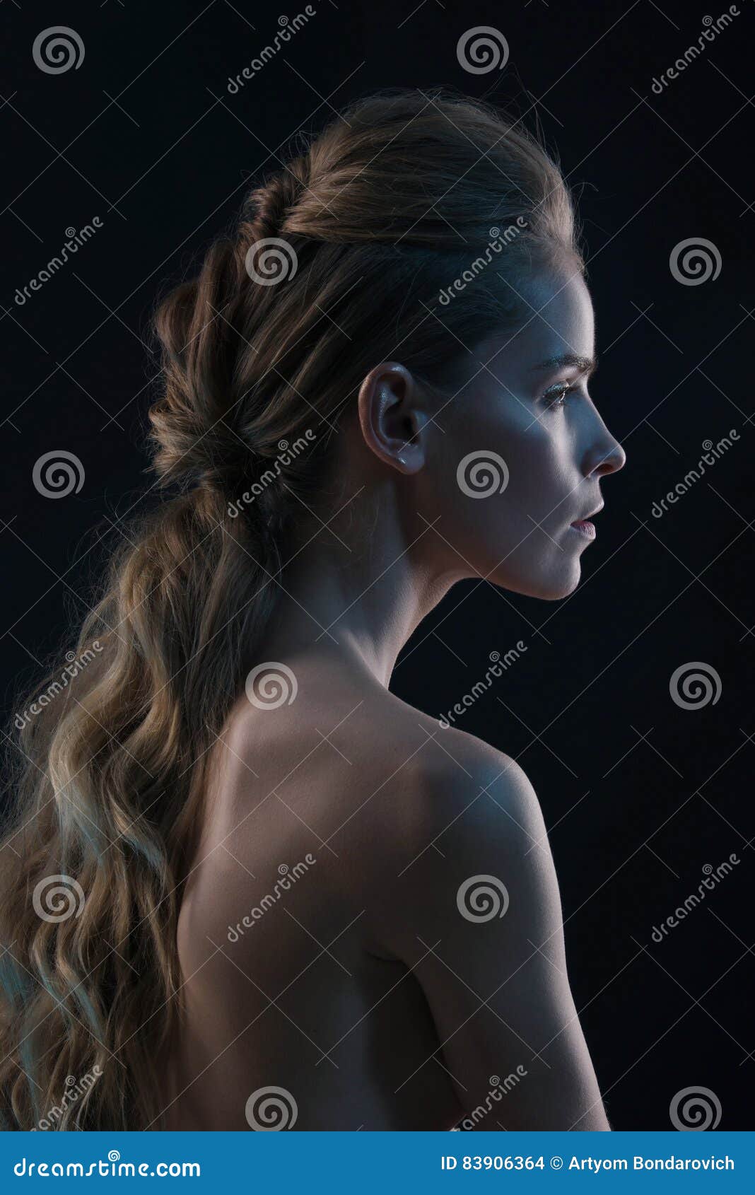 Fashion Portrait of Model in the Light Colored Spotlights. Stock Photo ...