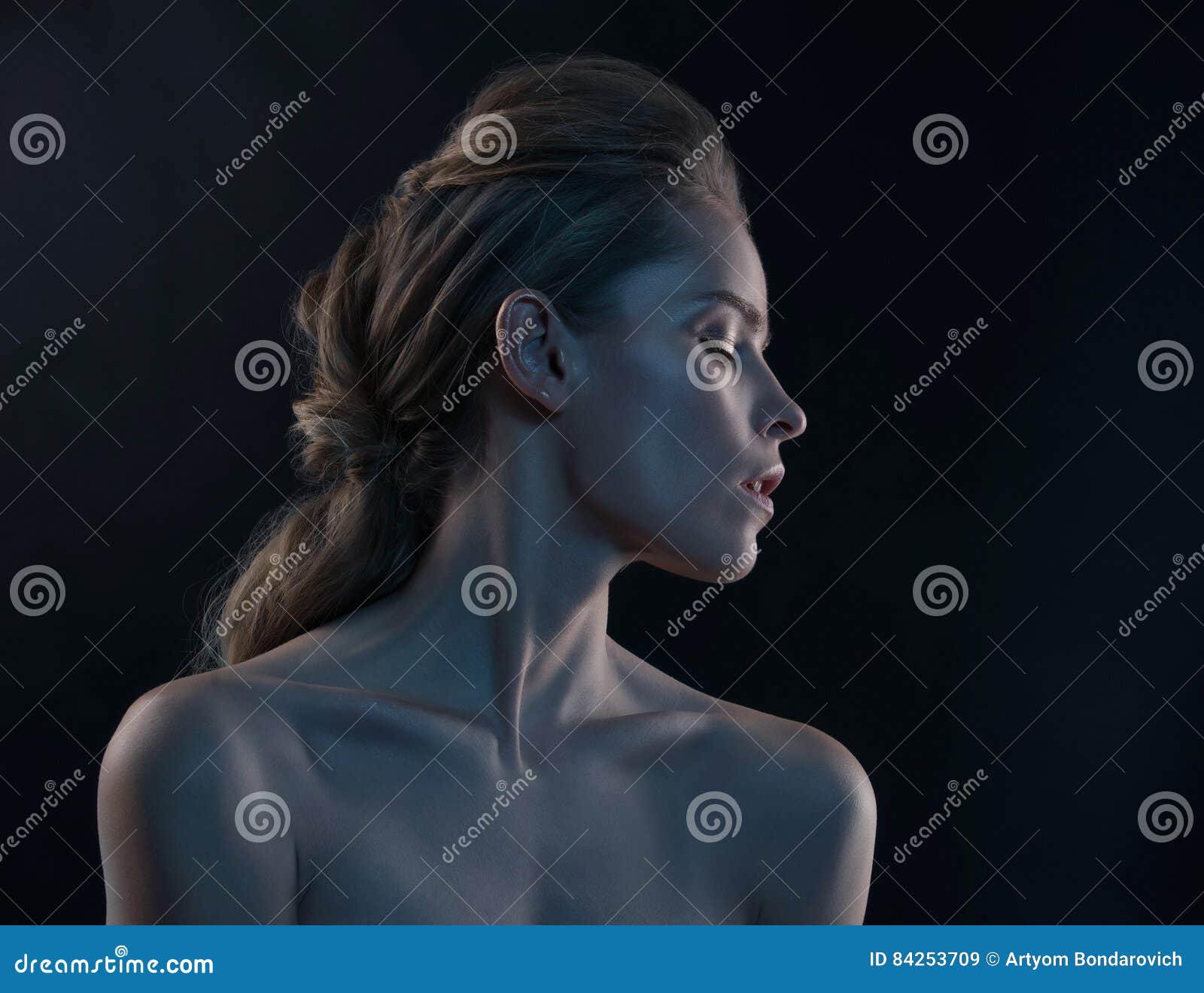 Fashion Portrait of Model in the Light Colored Spotlights. Stock Image ...