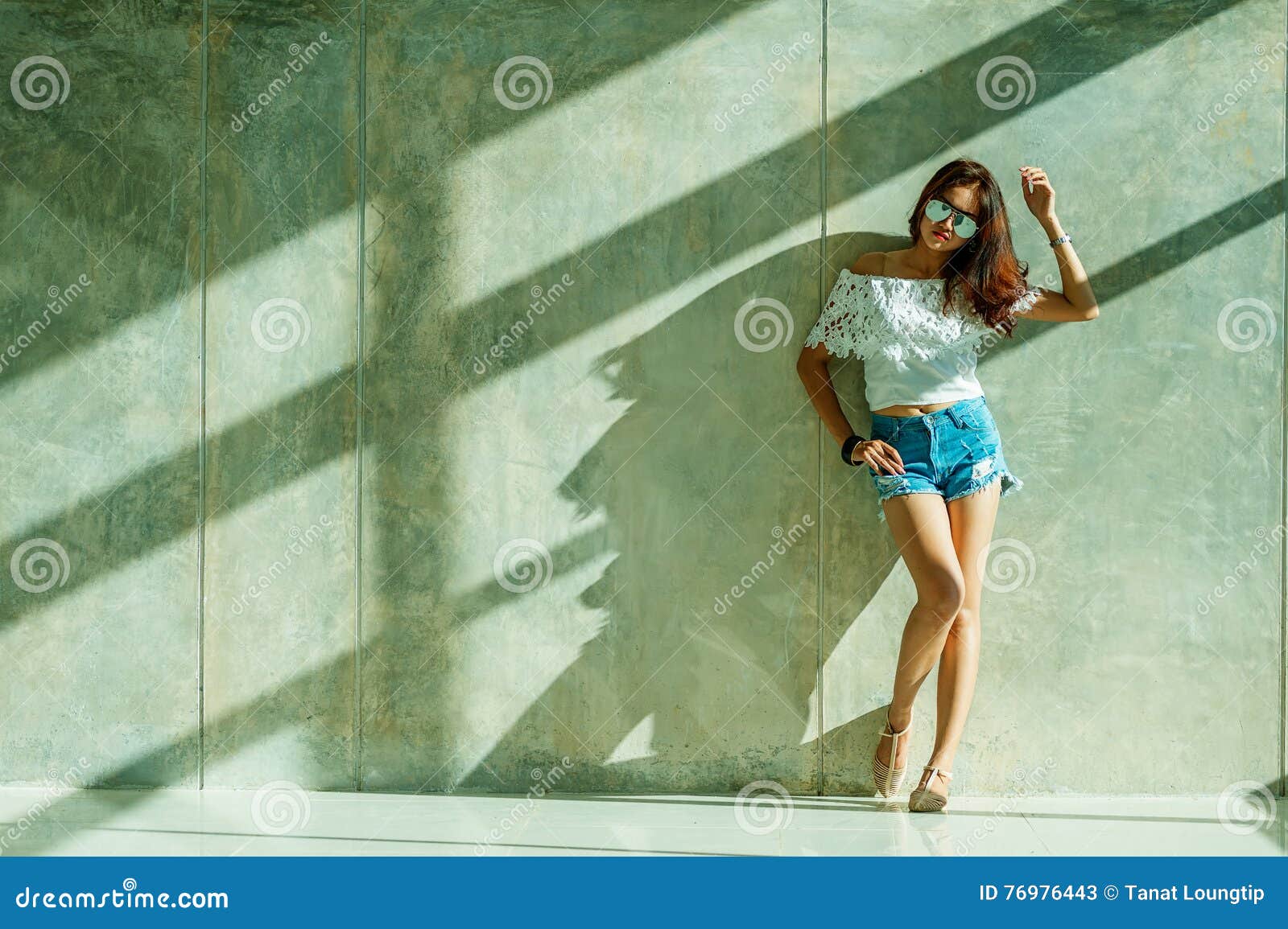 Fashion Portrait of Young Model Posing by the Wall Stock Image - Image ...