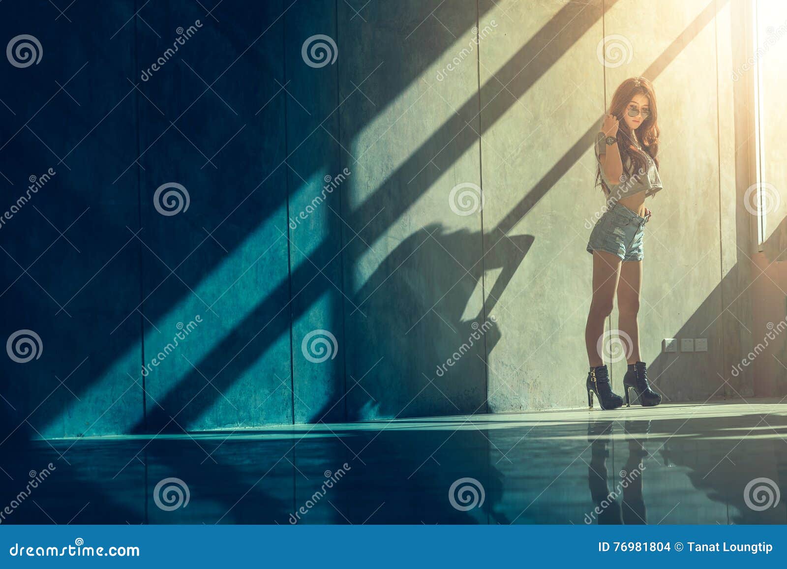 Fashion Portrait of Young Model Posing by the Wall Stock Photo - Image ...