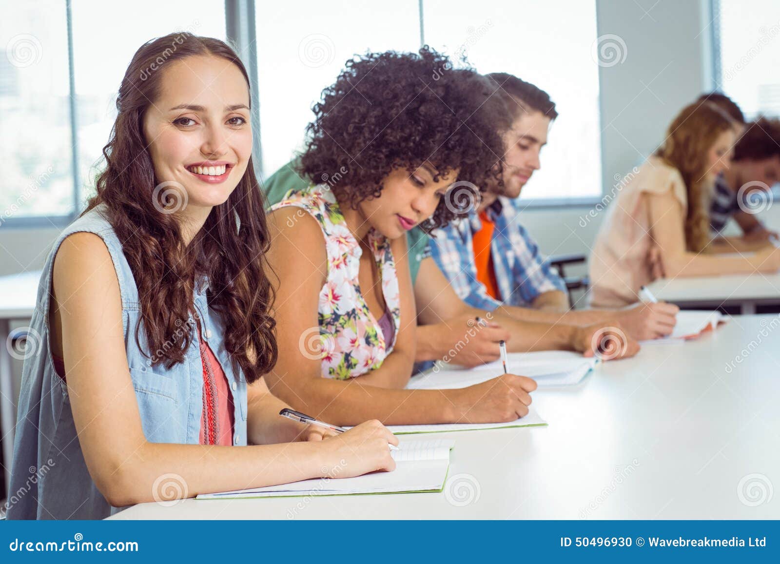 Fashion Student Taking Notes in Class Stock Photo - Image of mixedrace ...