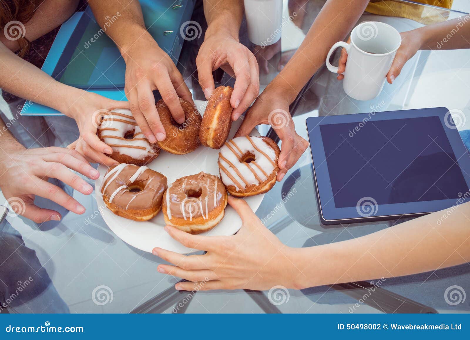 Fashion Students Eating Doughnuts Stock Photo - Image of female ...