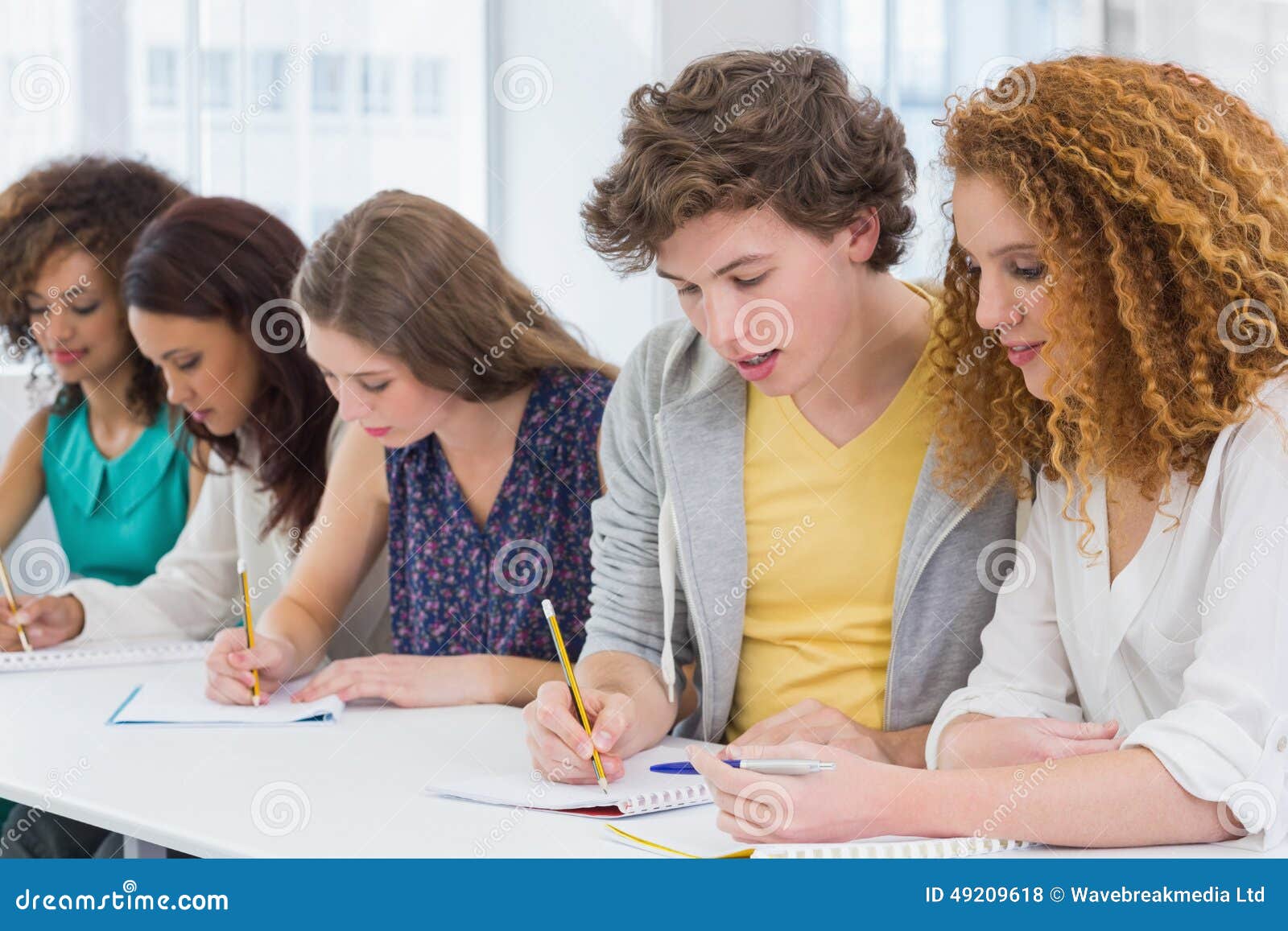 Fashion Students Taking Notes in Class Stock Photo - Image of caucasian ...