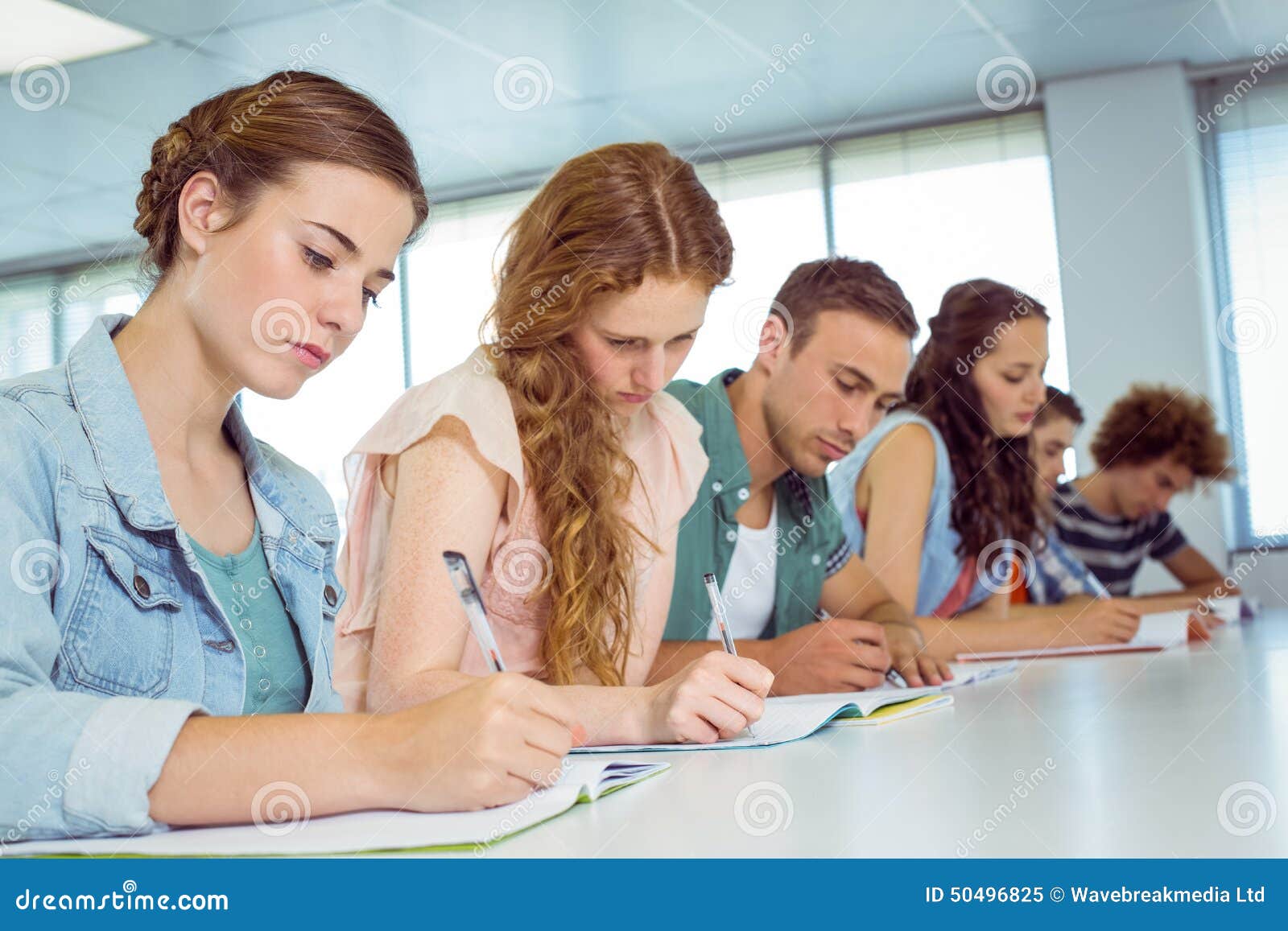 Fashion Students Taking Notes in Class Stock Image - Image of notepad ...