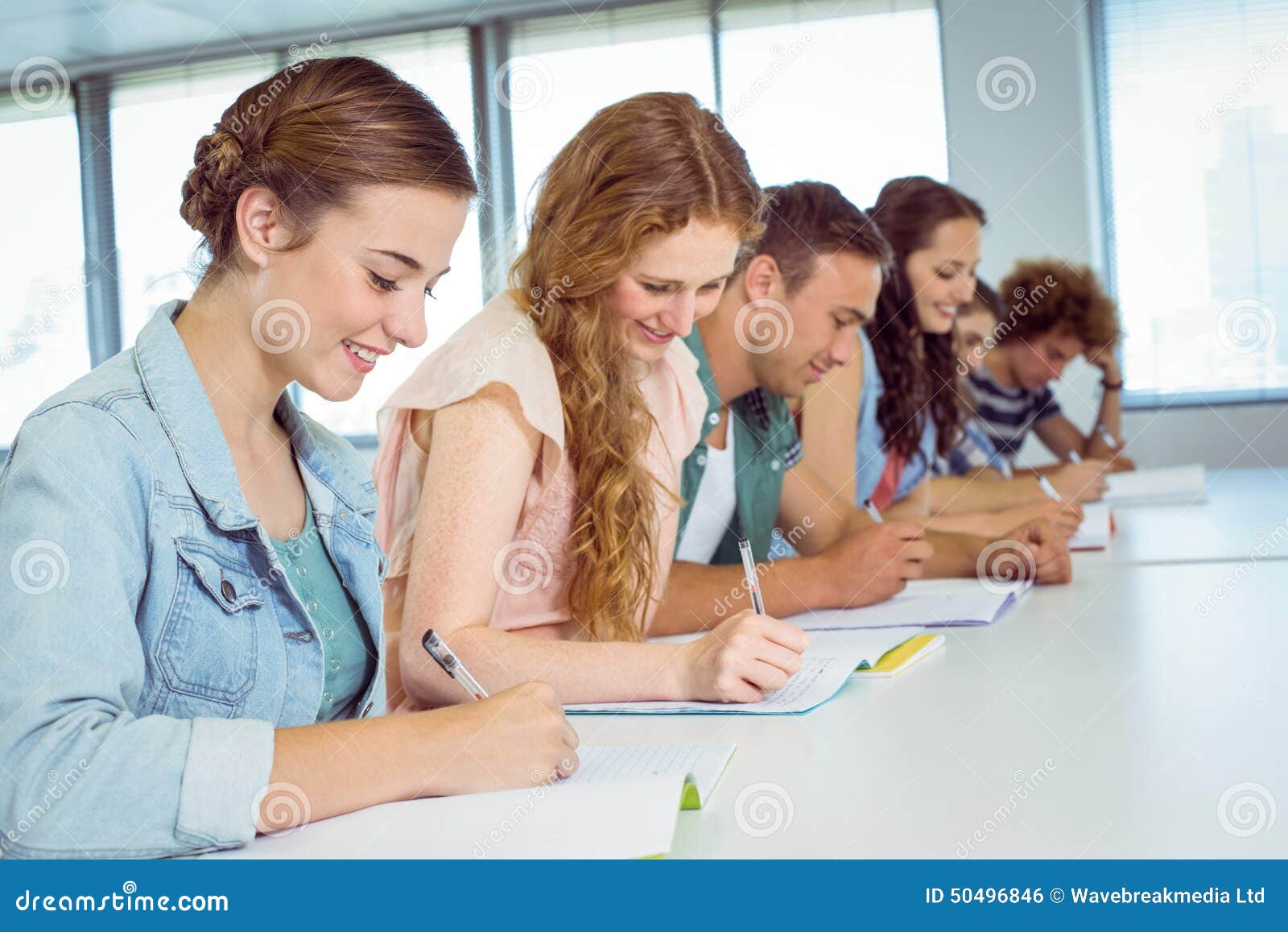 Fashion Students Taking Notes in Class Stock Photo - Image of people ...