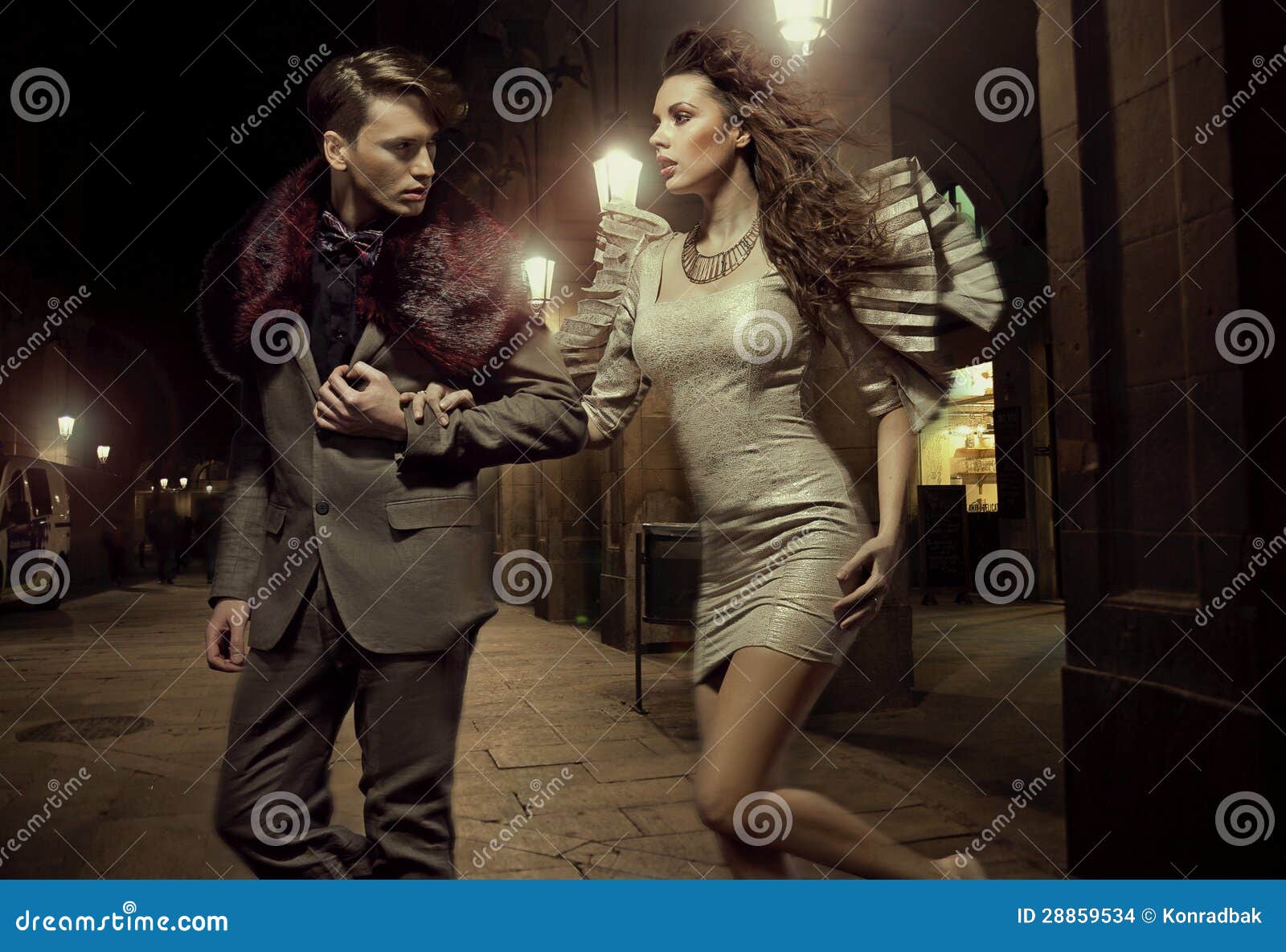 Fashionable Couple at Nightly Walk Stock Photo - Image of romance, city ...
