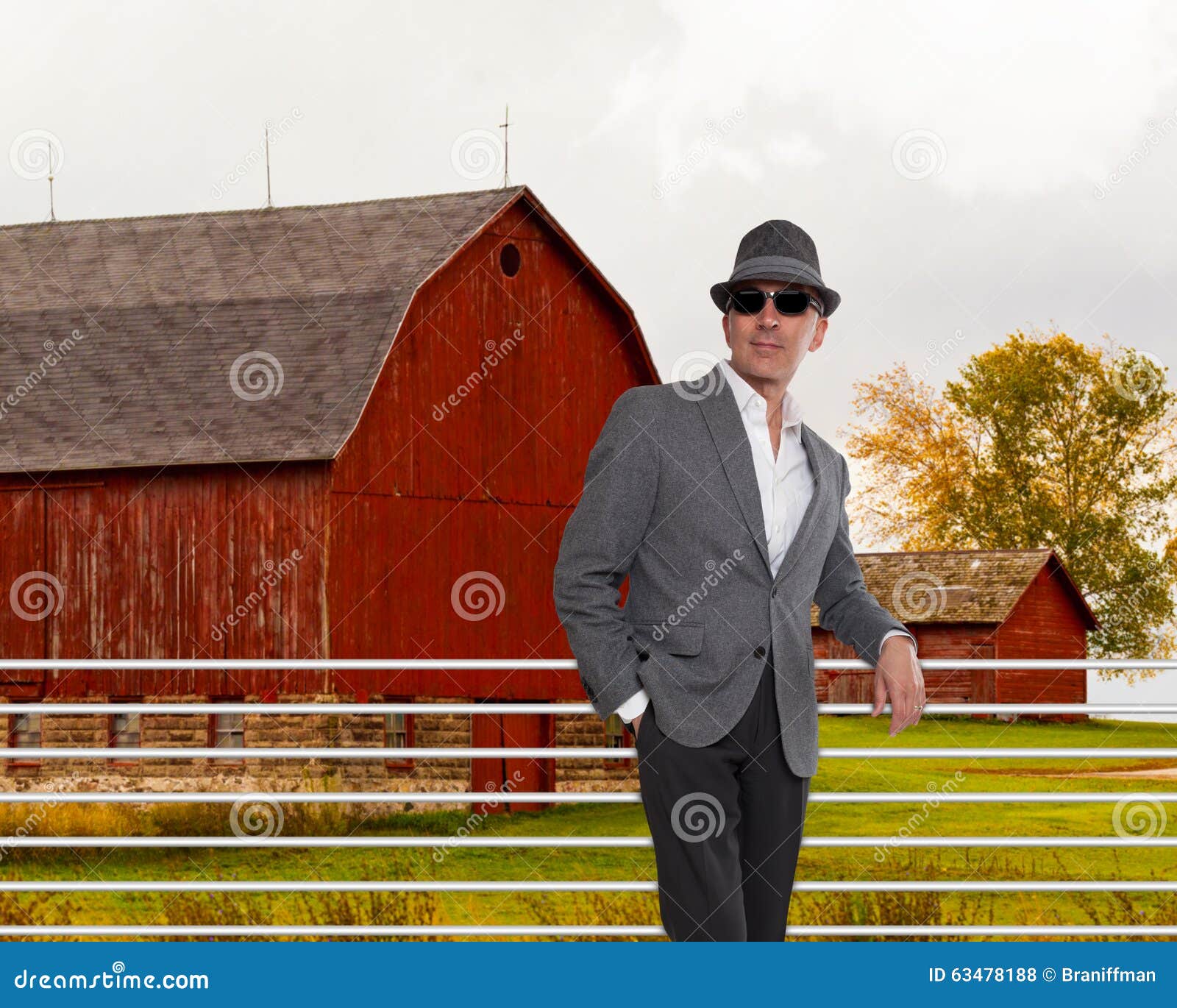 Fashionable Man Standing in from of a Red Barn Stock Photo - Image of ...