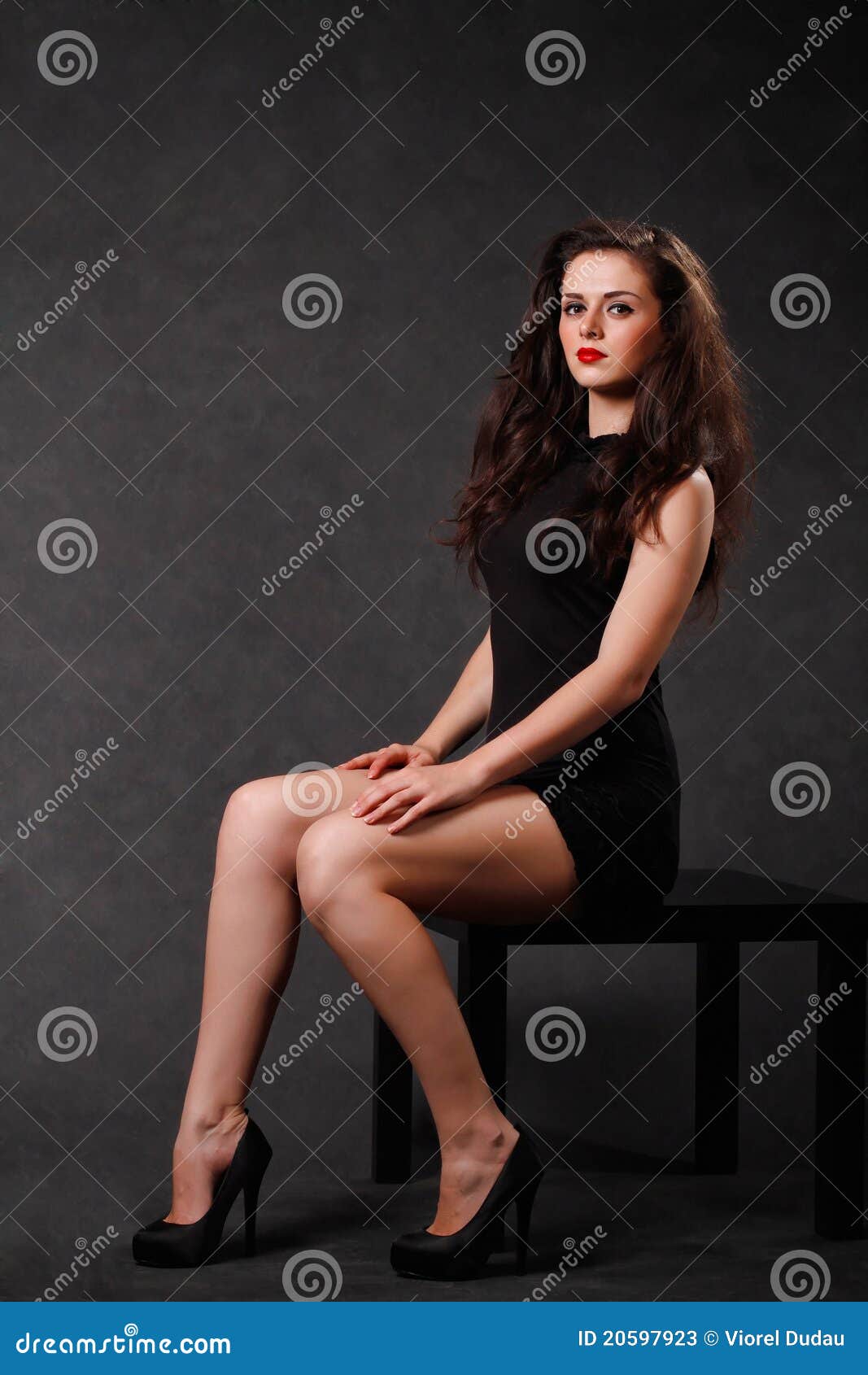 Fashionable young woman stock image. Image of posing - 20597923