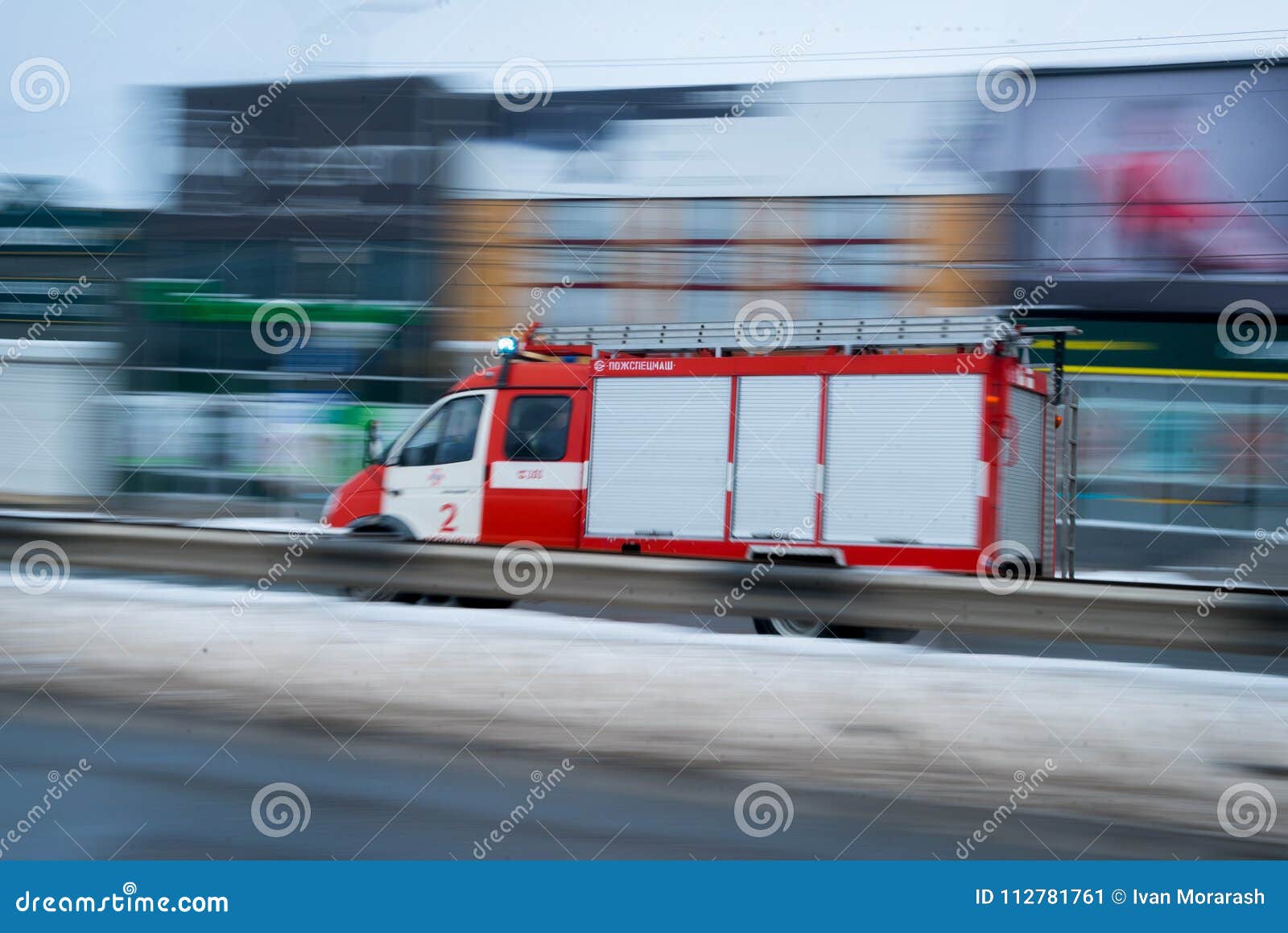Fast Driving Fire Truck in a City Editorial Photo - Image of engine ...