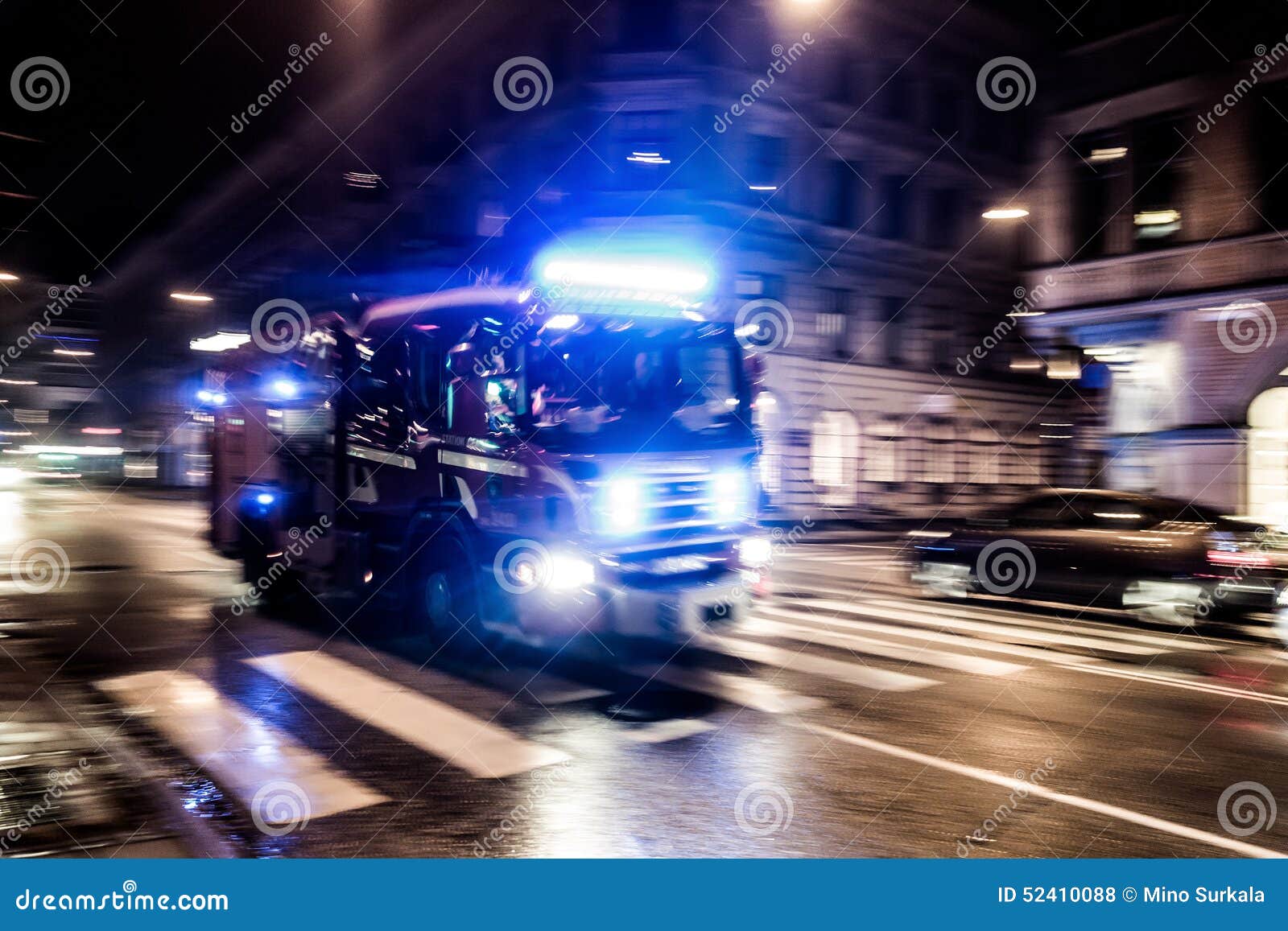 Fast driving fire truck stock photo. Image of rescue - 52410088