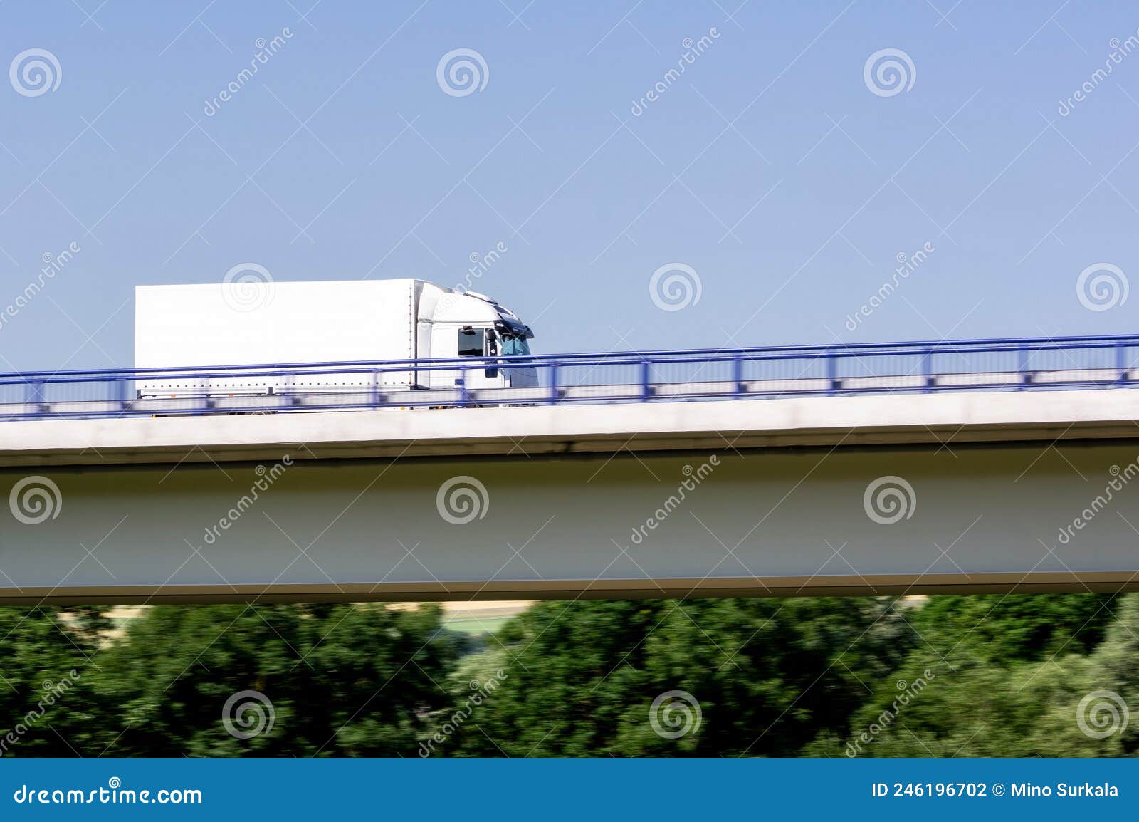 Fast Driving White Truck on a Highway Bridge Stock Photo - Image of ...