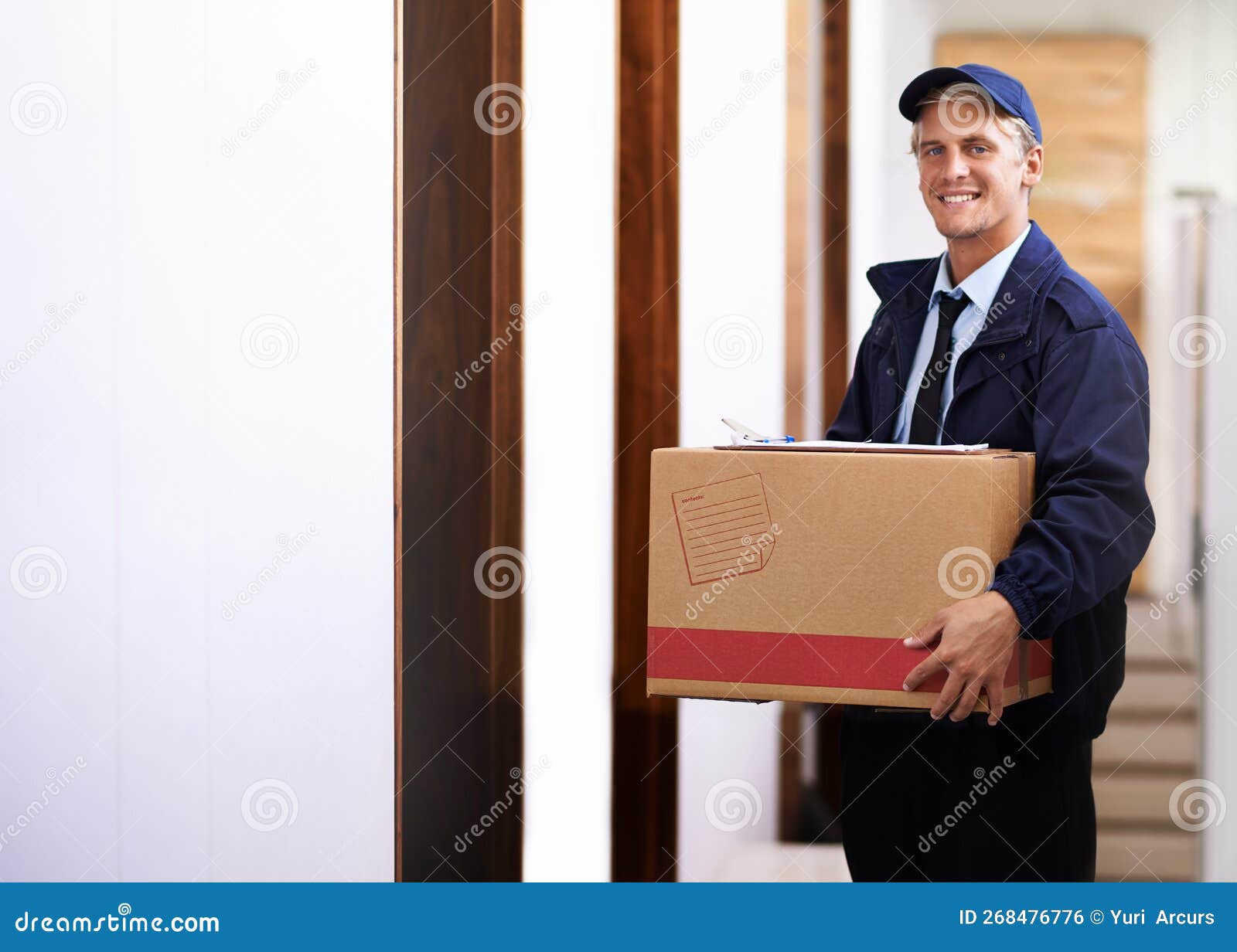 Fast and Efficient Service. Delivered. Portrait of a Confident Young ...