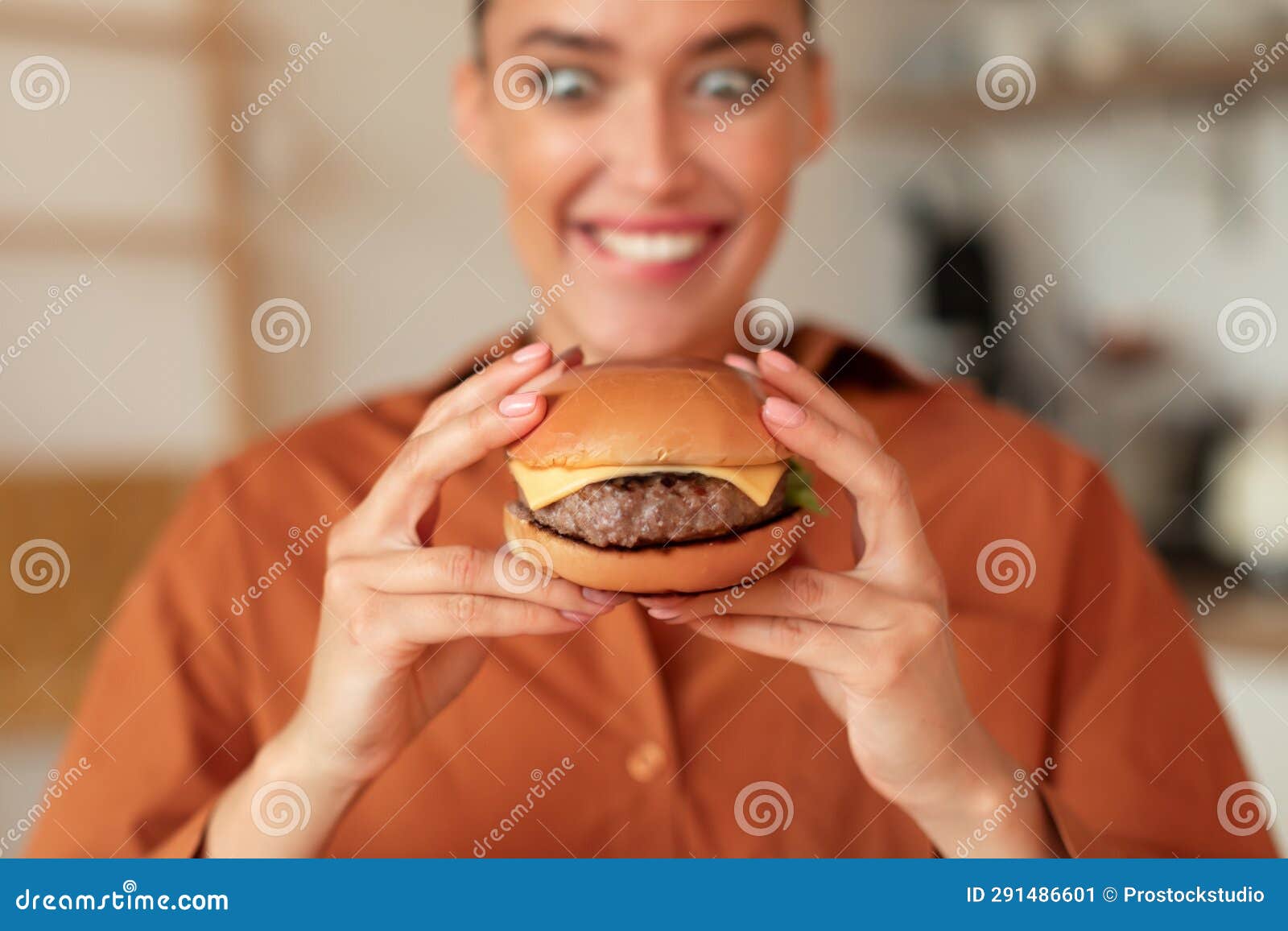 Fast Food Addiction Portrait Of Hungry Woman Holding Burger And Looking At It With Wide Open 0443