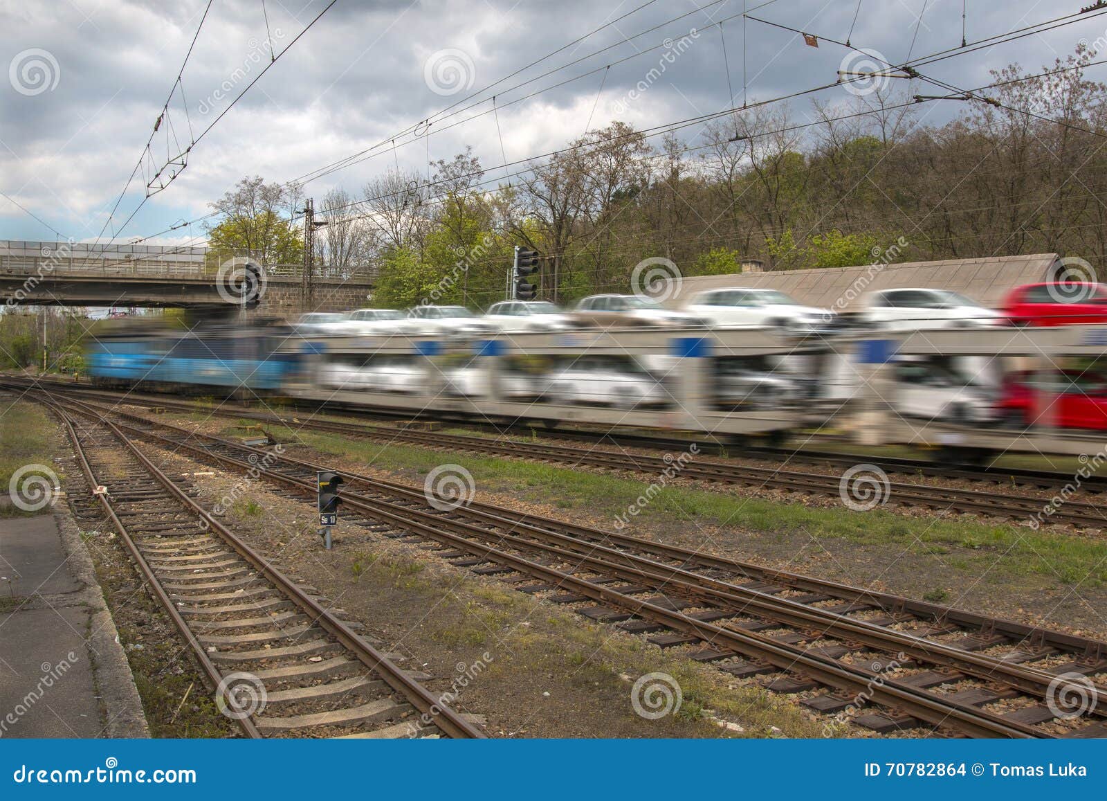 Fast Freight Train is Transporting Cars on Rails Stock Photo - Image of ...