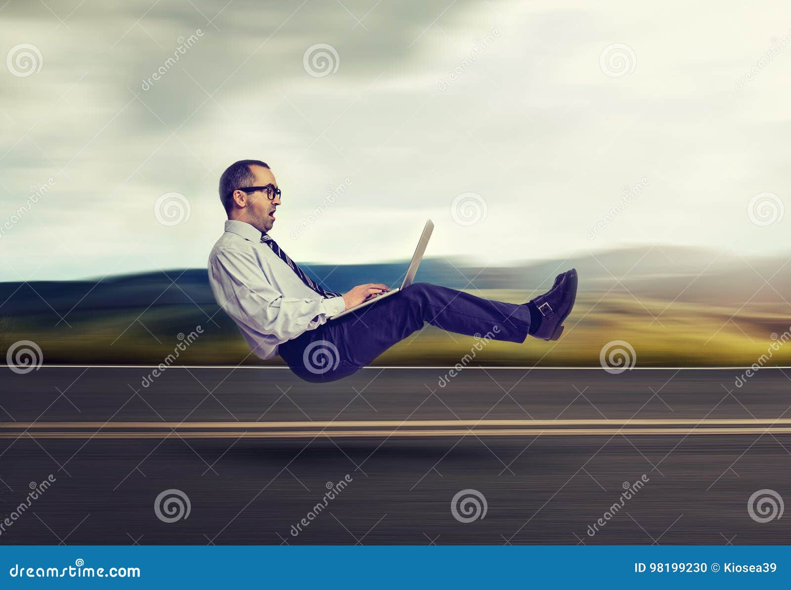 Fast Internet Concept. Levitating Business Man on Road Using Laptop ...