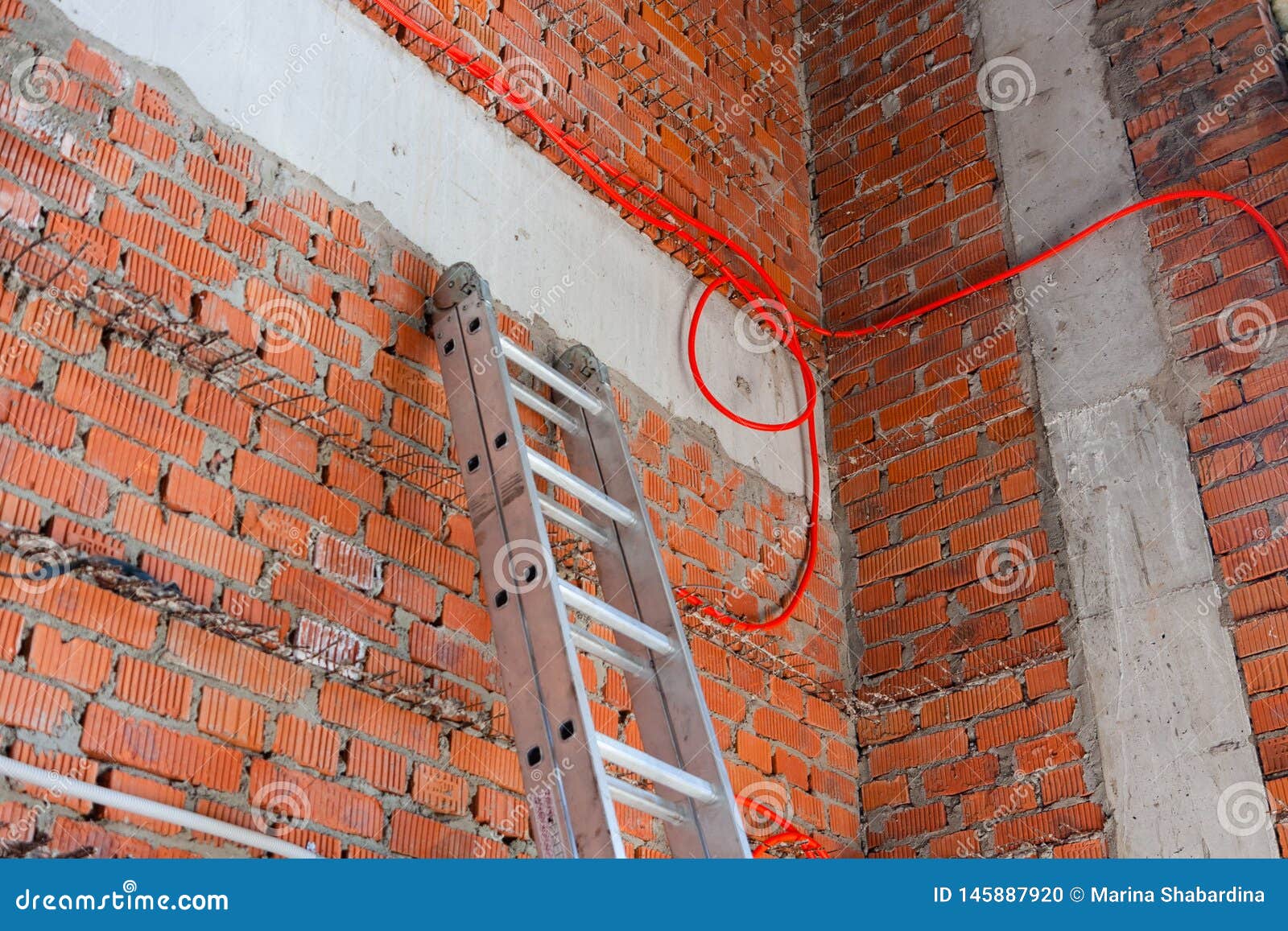 Fast Ladder at the Brick Wall and Wires Stock Photo - Image of upkeep ...