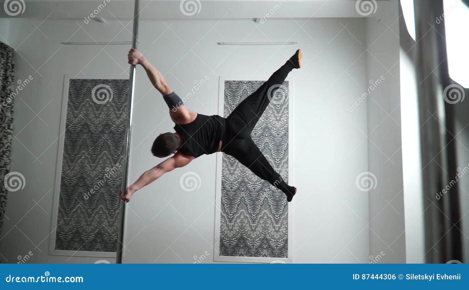 Fast Man Shot in Black Suit Dancing on the Pylon Stock Footage - Video ...