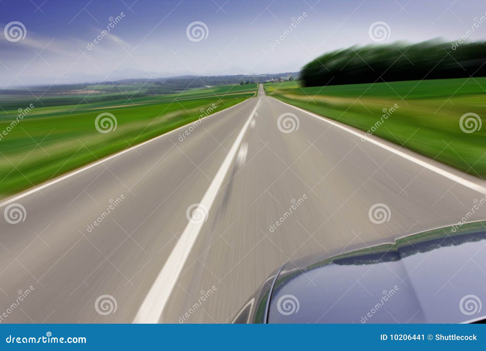 Fast moving car on road stock image. Image of blue, energy - 10206441