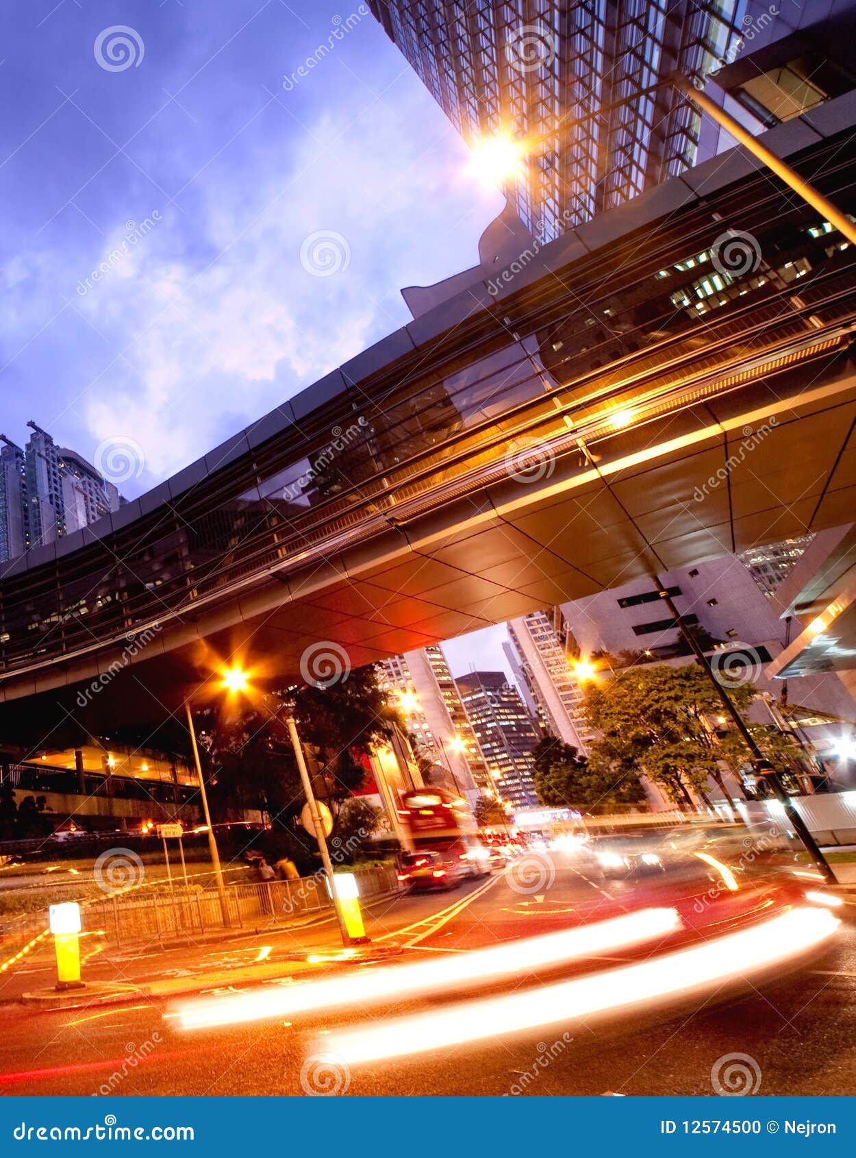 Fast moving cars at night stock photo. Image of skyscraper - 12574500
