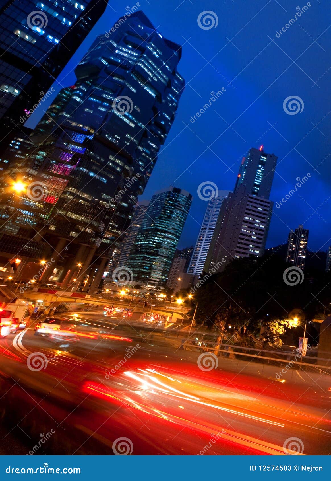 Fast moving cars at night stock image. Image of skyscraper - 12574503