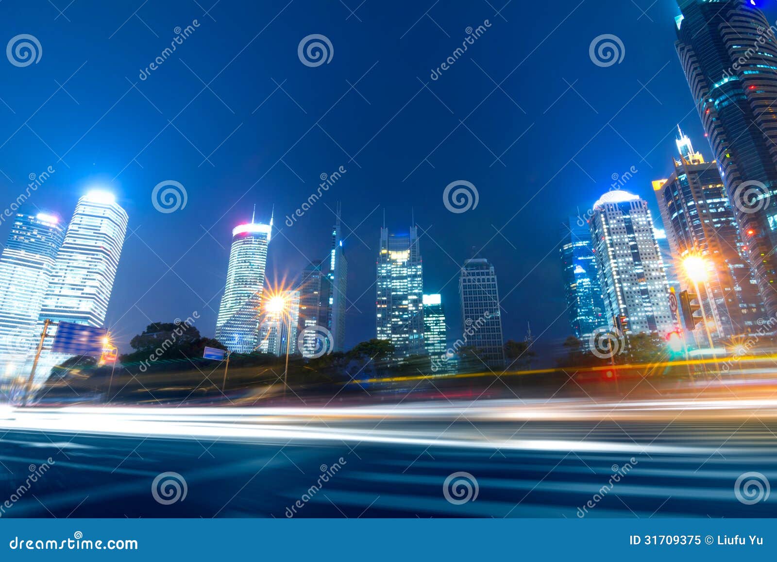 Fast moving cars at night stock image. Image of landmark - 31709375