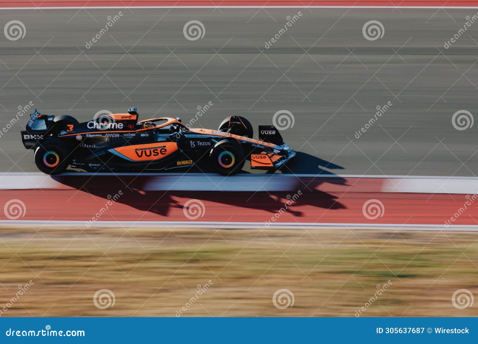 Fast-moving Racing Car Speeds Along a Racetrack, Creating a Dynamic and ...