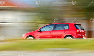 Fast moving red car stock photo. Image of camera, joyride - 2511276
