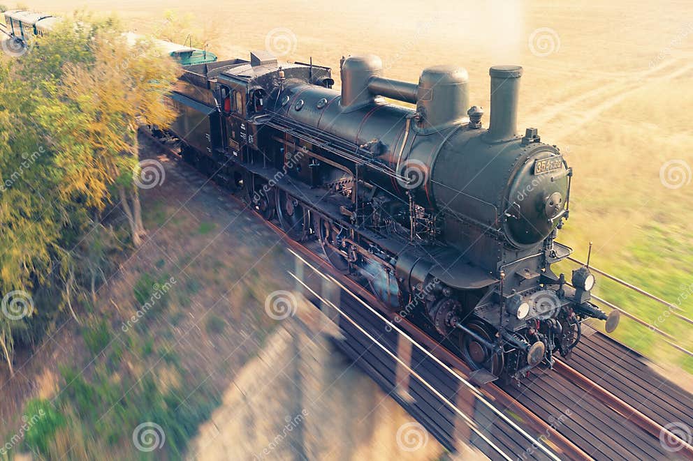 Fast Moving Steam Train while Driving between Fields Stock Photo ...