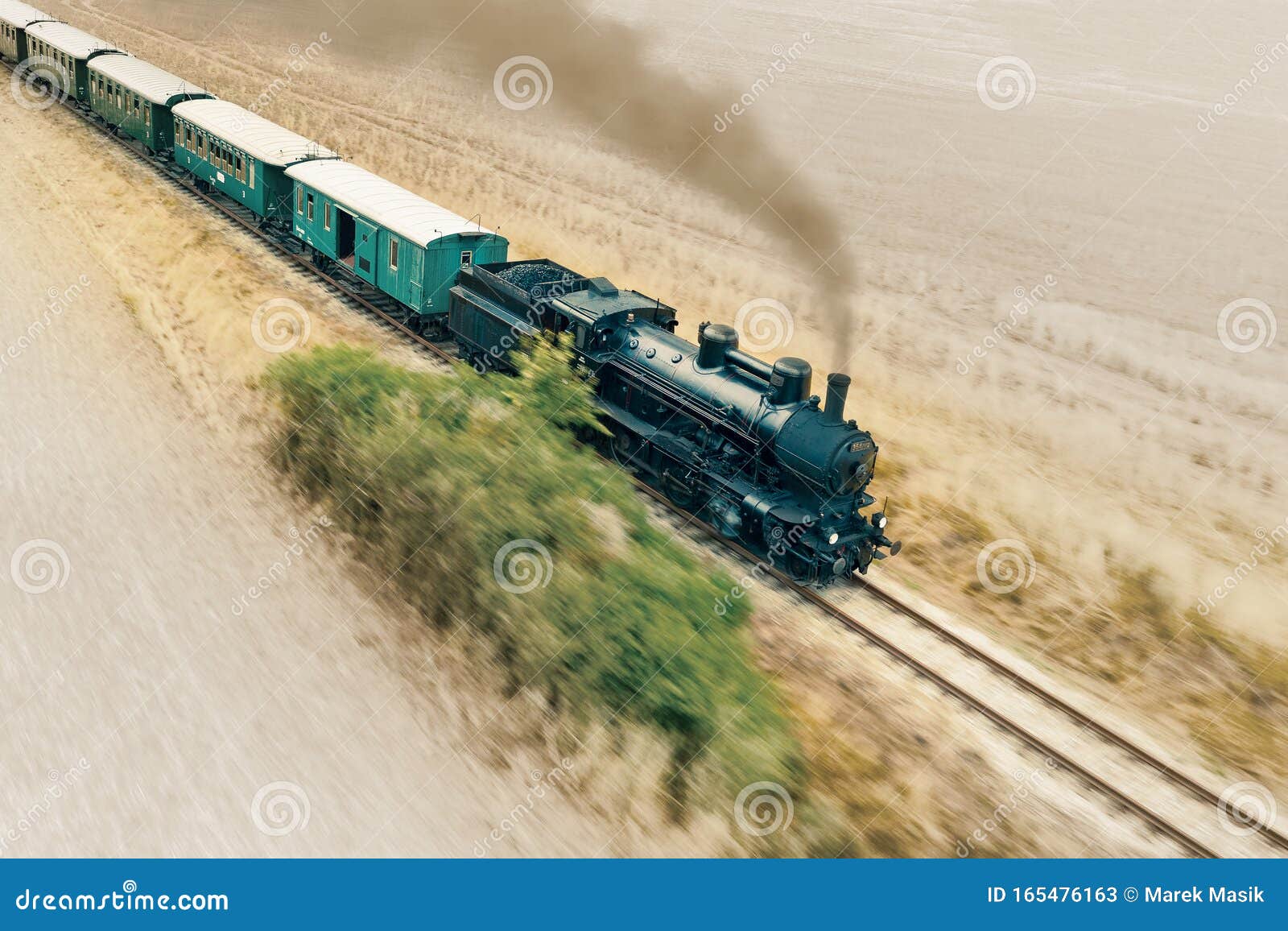 Fast Moving Steam Train while Driving between Fields Stock Image ...
