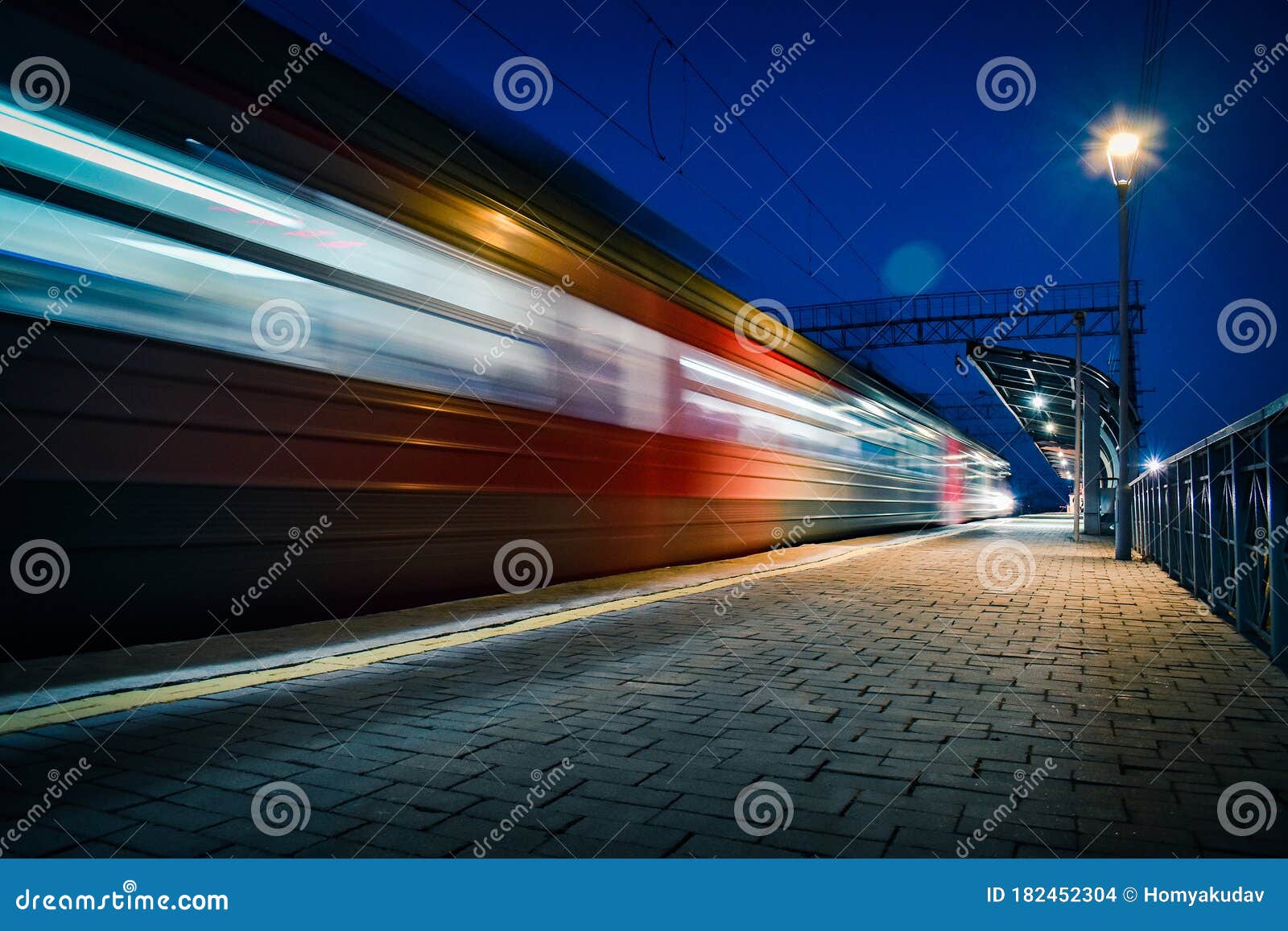Fast moving train at night stock photo. Image of transportation - 182452304