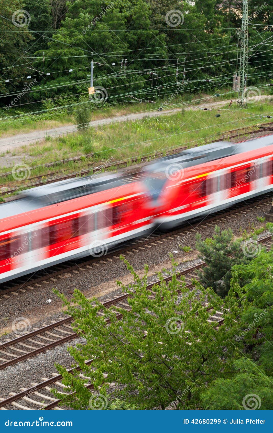 Fast Moving Train with Red Stripe Stock Image - Image of coaches ...