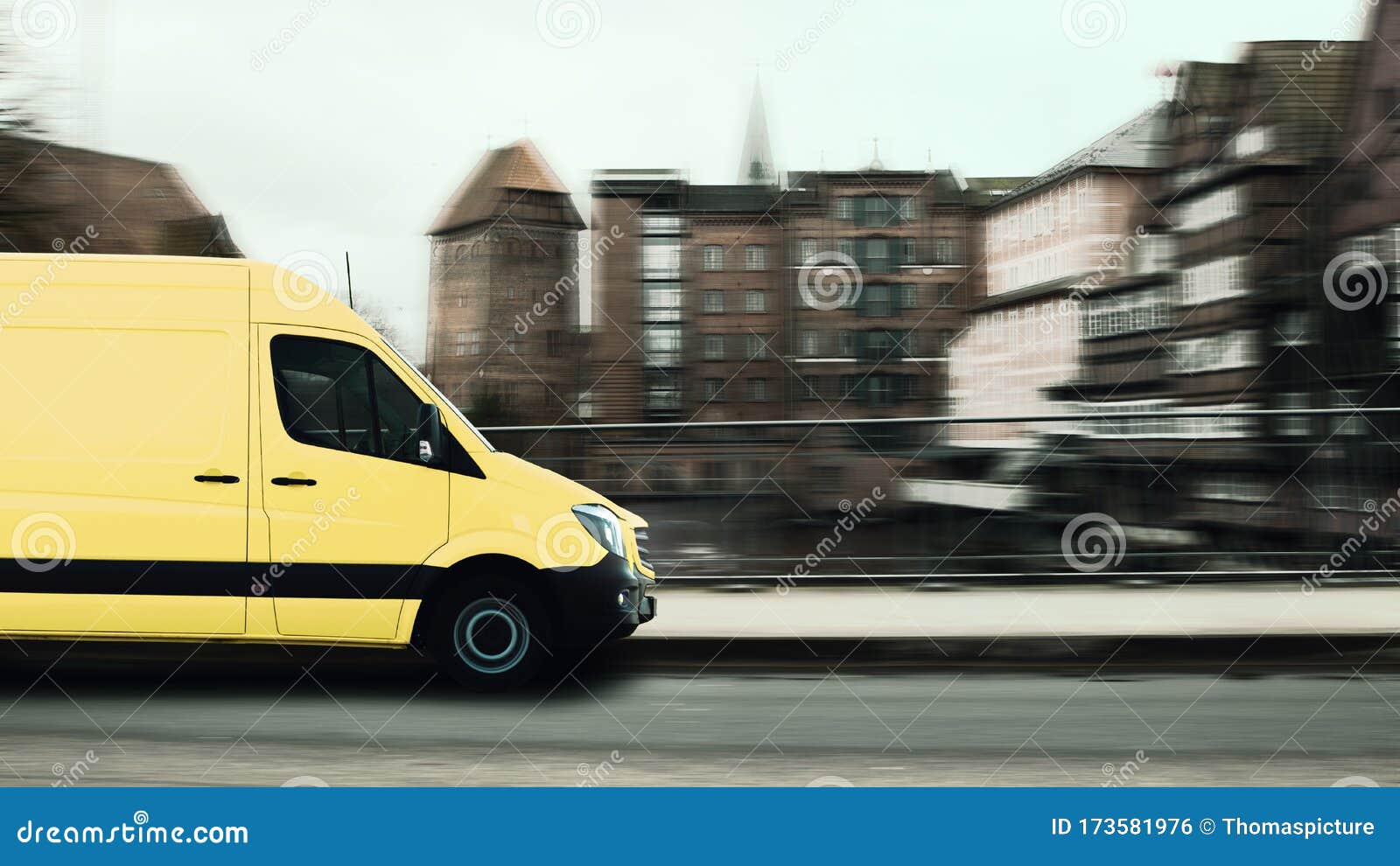 Fast Parcel Delivery, Yellow Mail Van in a Historic Small Town Stock ...