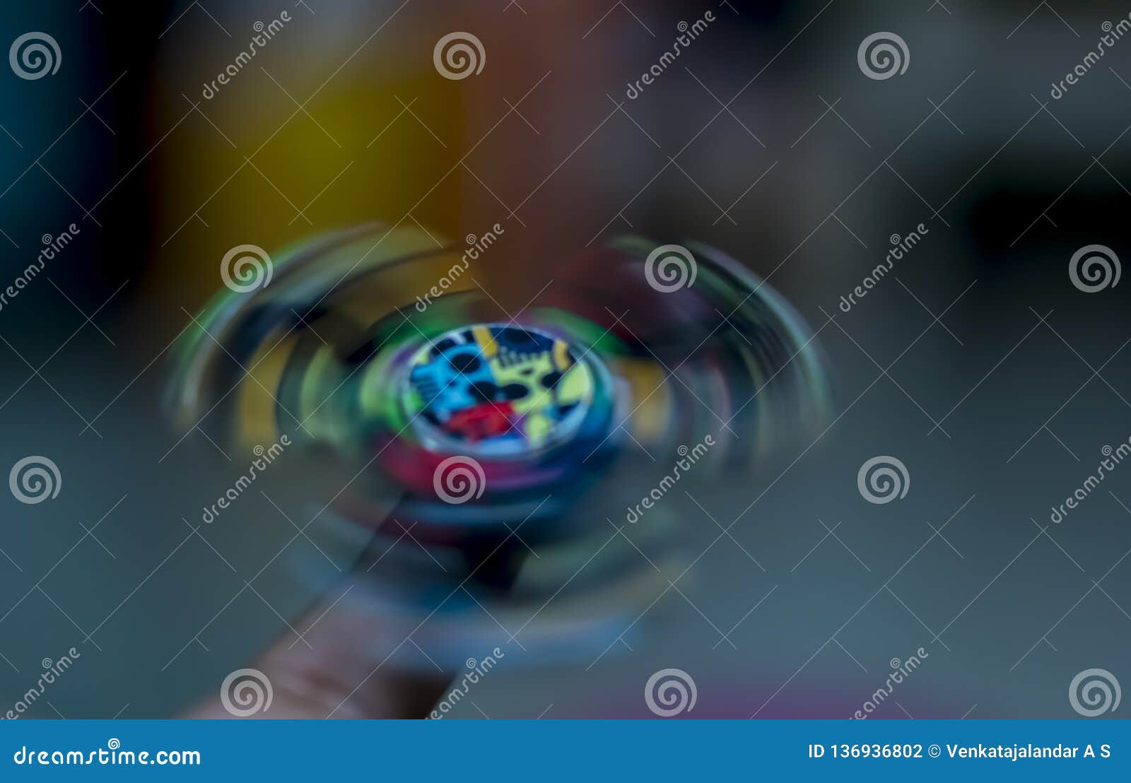 Fidget Spinner - Spinning on a Finger Stock Photo - Image of gadget ...