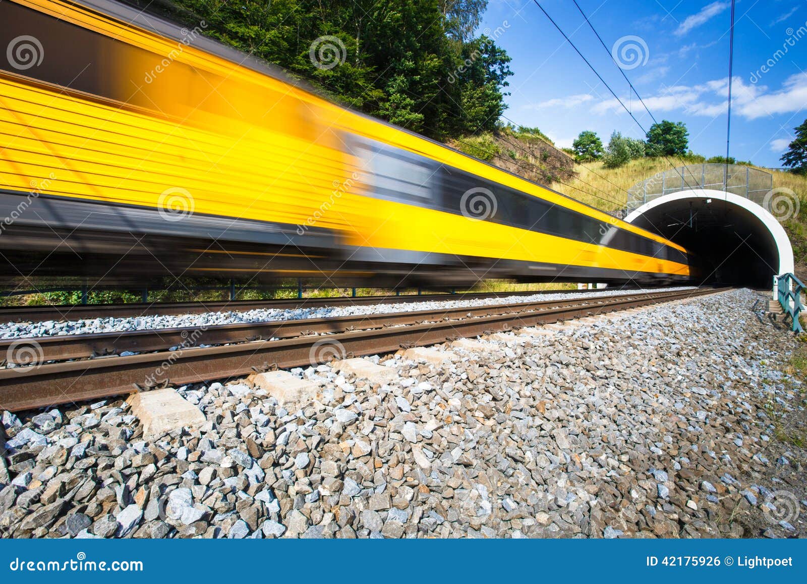 Fast Train Passing through a Tunnel on a Lovely Summer Day Stock Photo ...