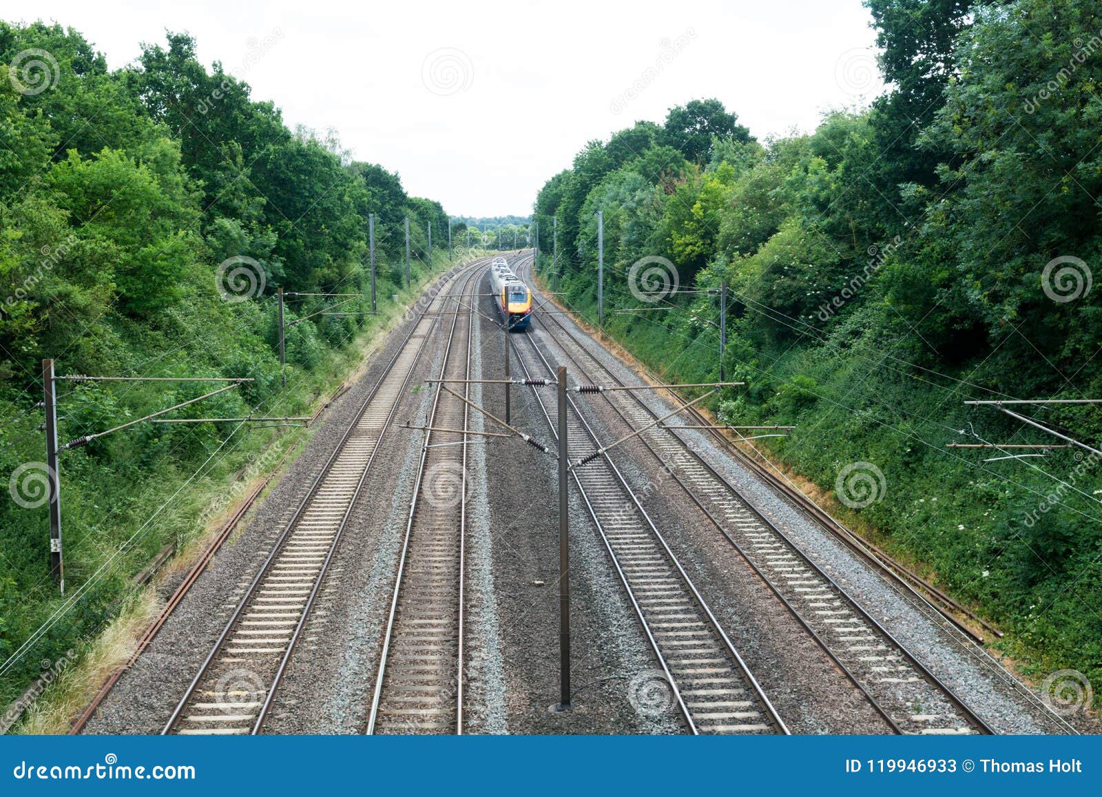 Fast Train Travelling on the Tracks, Passenger Train Stock Image ...