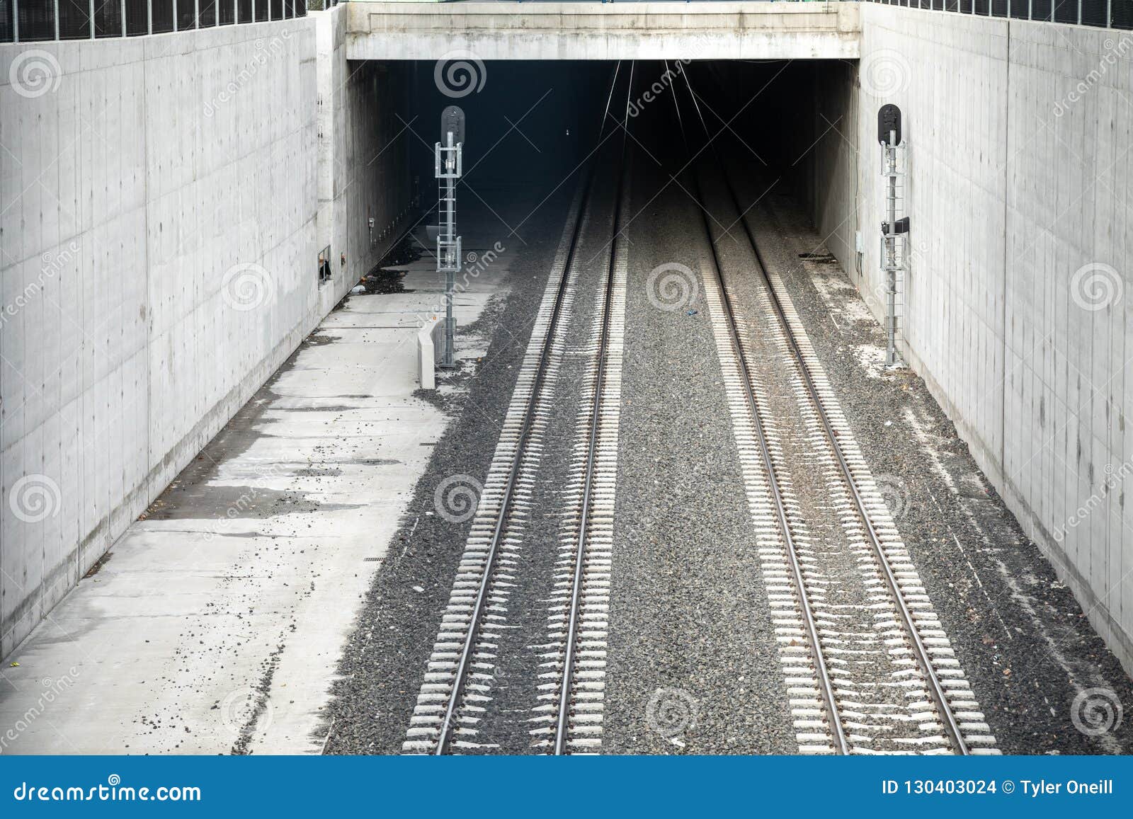 A Railroad Corssing With A Red Warning Sign And Warning Lamp And A ...