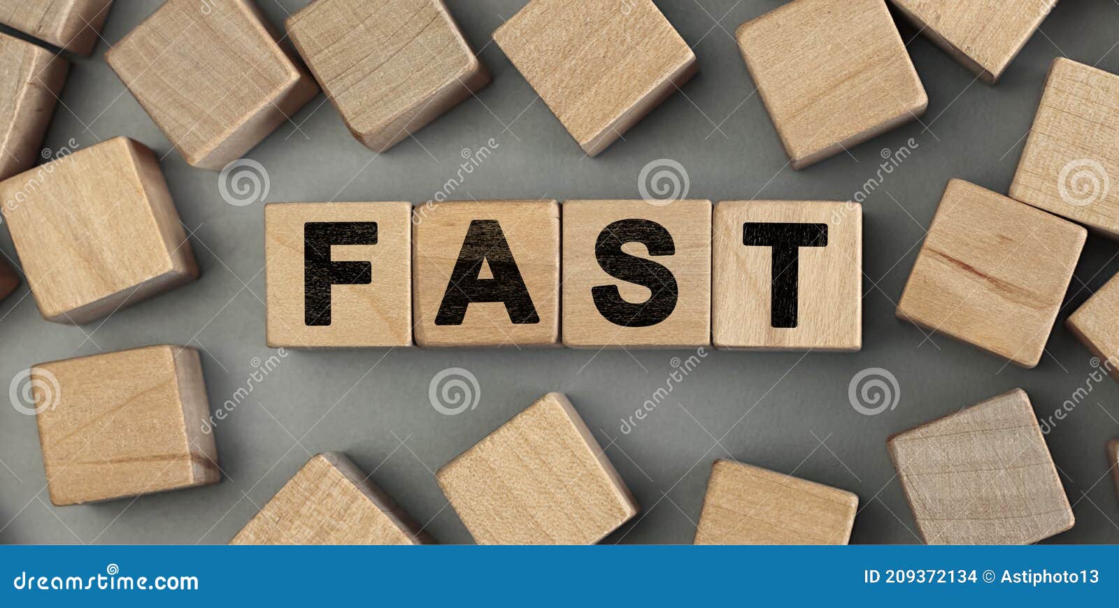FAST - Word Concept from Wooden Blocks. Top View Stock Photo - Image of ...