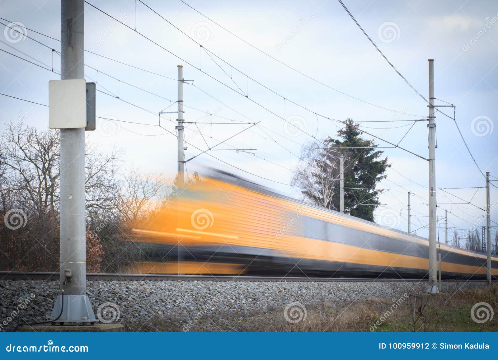 Fast Yellow Train on the Railway Motion Blurred Image Stock Photo ...