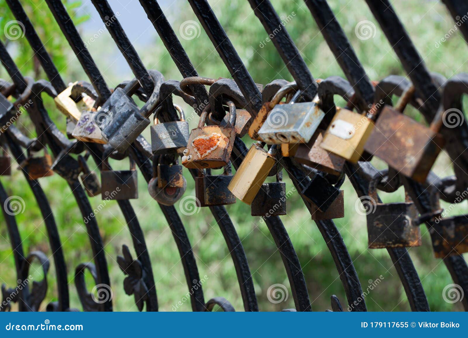 Fastened Small Locks on the Fence Left by Lovers Stock Image - Image of ...