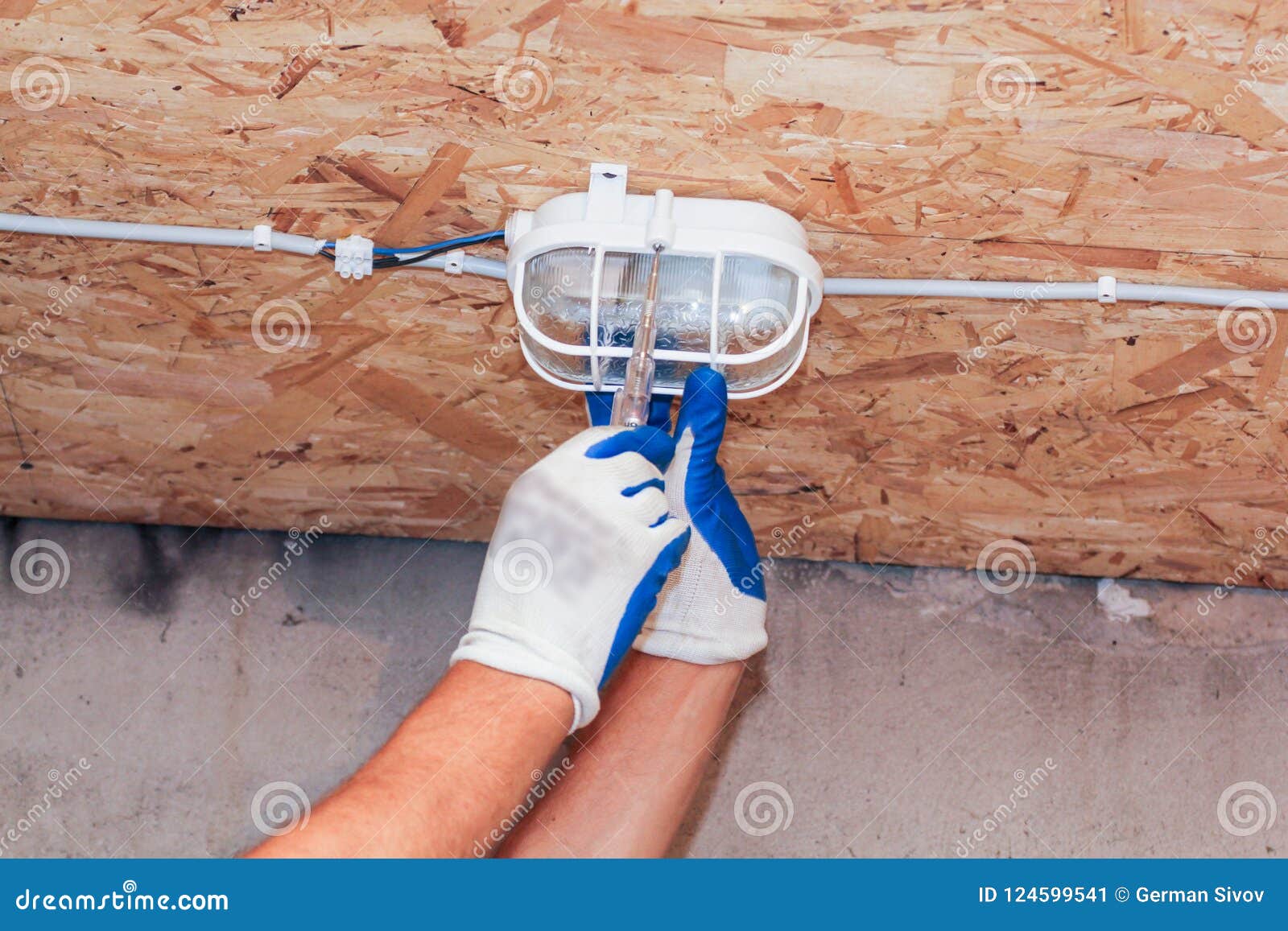 Fastening the Ceiling Lamp on the Ceiling. Stock Image - Image of ...