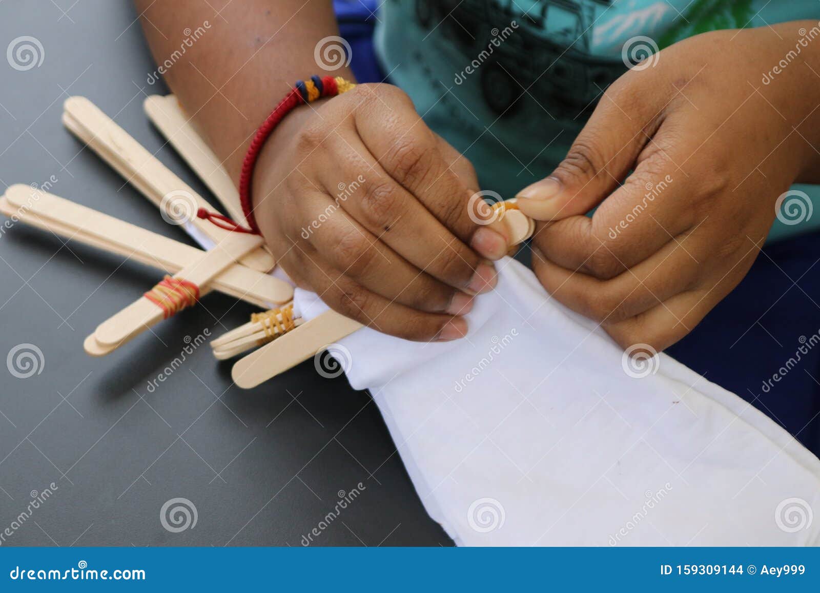 Fastening by Device is Part of the Process of Making Tie-dye Fabrics ...