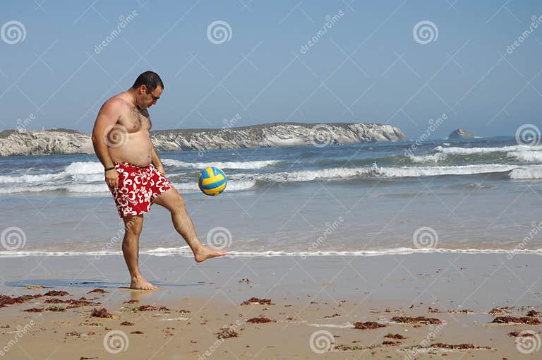 Fat Man Playing with a Ball on the Beach Stock Photo - Image of lake ...