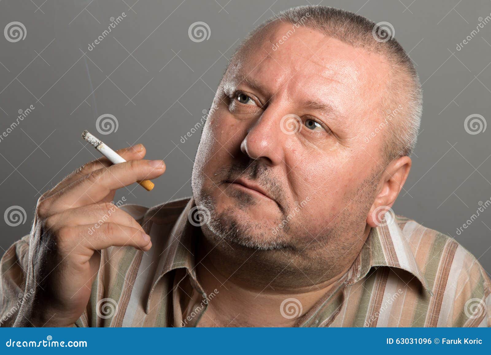 Fat man smoking cigarette stock photo. Image of closeup - 63031096