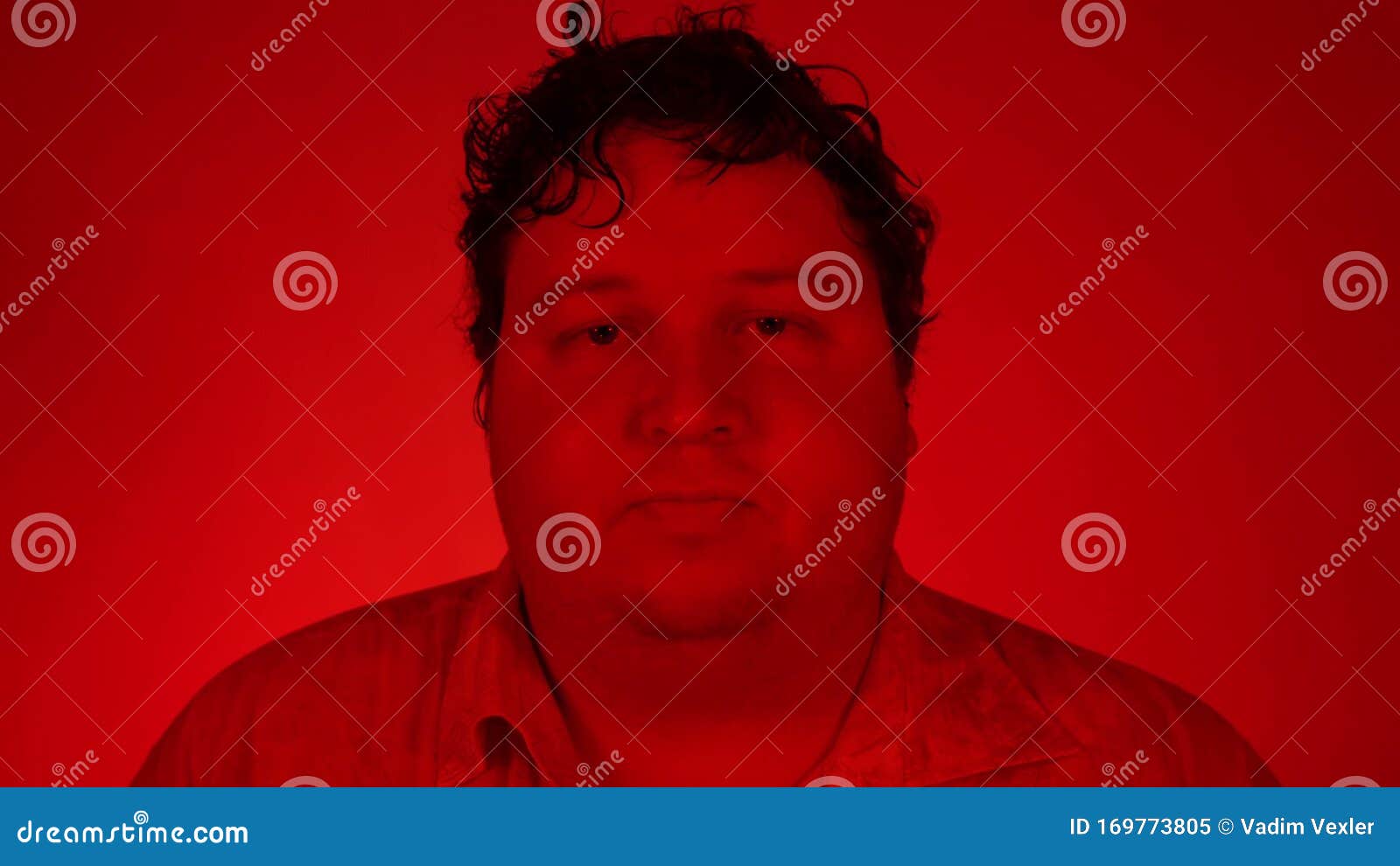 Fat Man Standing Behind Red Neon Lights and Looking at Camera Stock ...