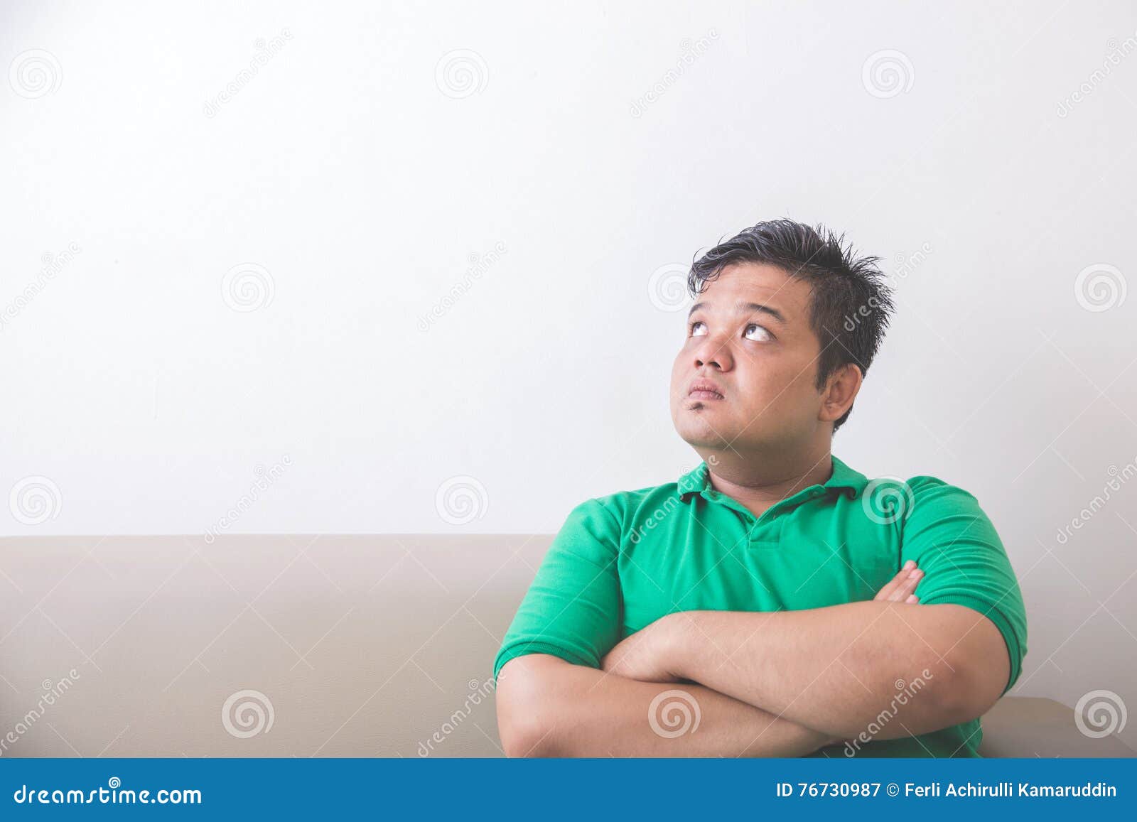 Fat Man Thinking and Looking Up To Copyspace Stock Image - Image of ...