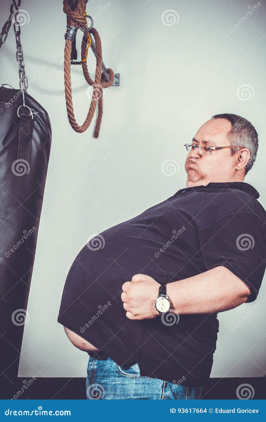 Fat man trains box in gym stock photo. Image of background - 93617664