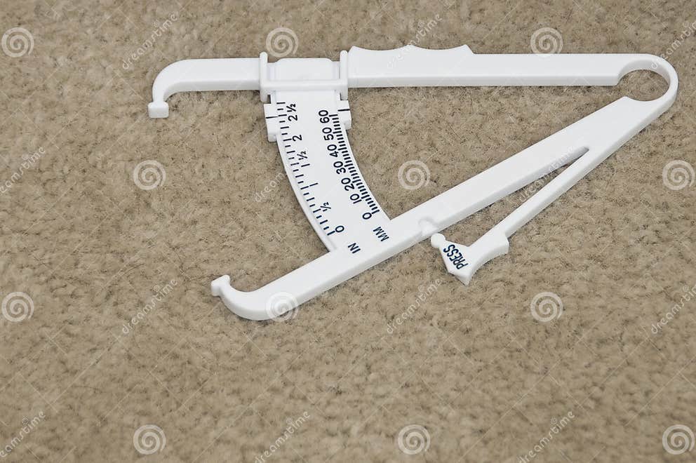 Fat measuring Device stock image. Image of exercise, scales - 10913241