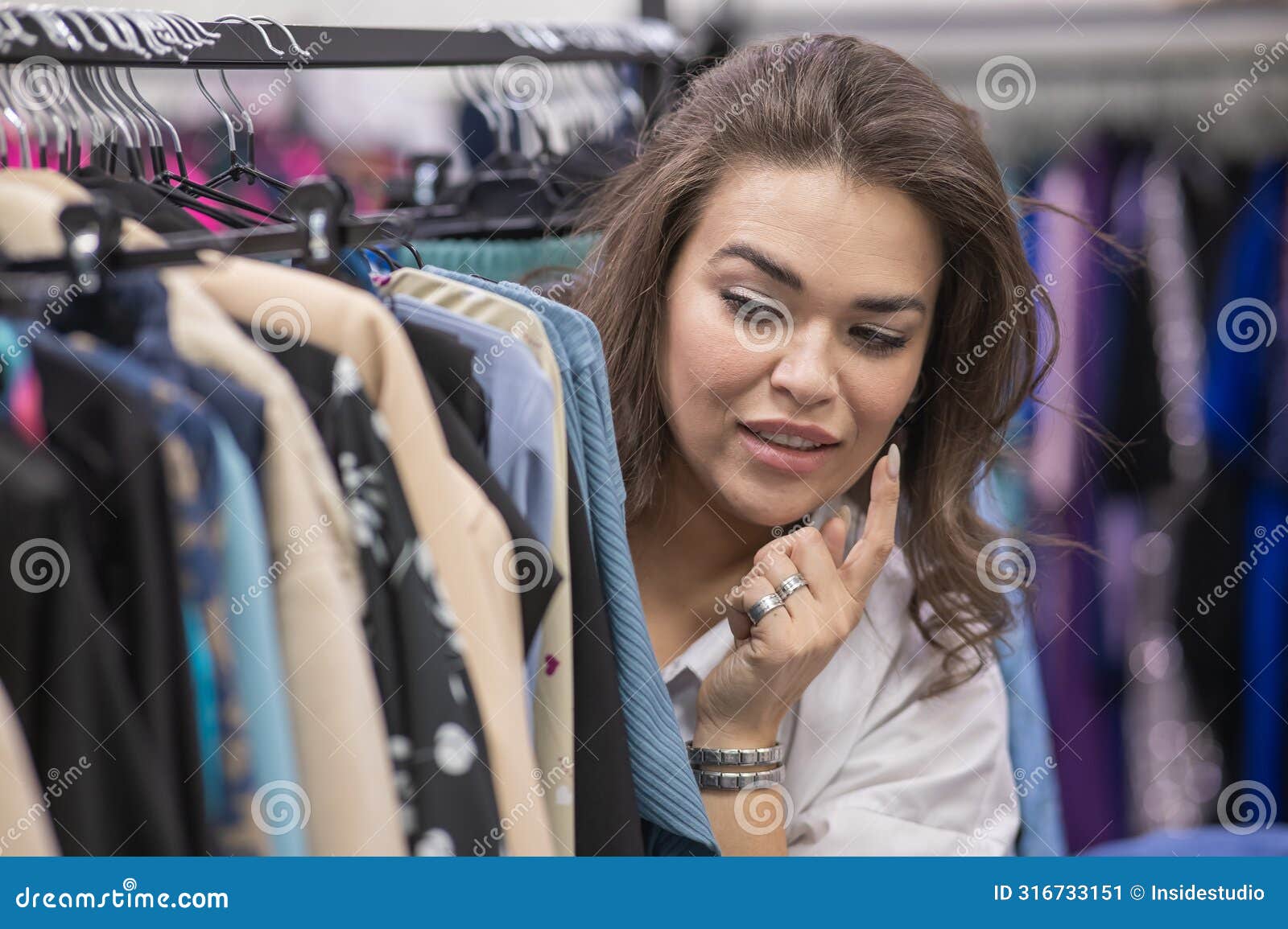 A Fat Woman Chooses Clothes in a Plus Size Store. Stock Image - Image ...